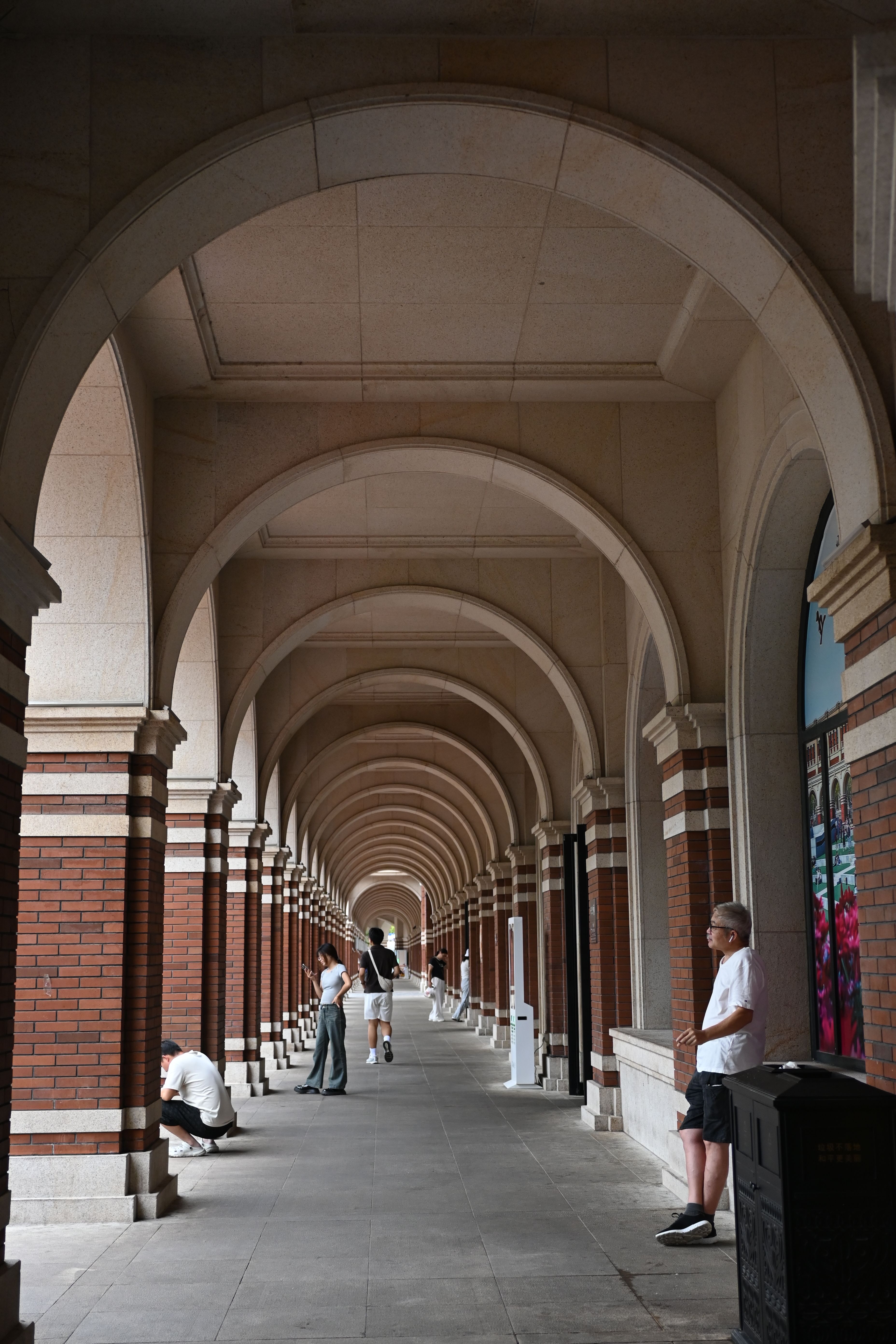 Architectural Archways with People Outdoors · Free Stock Photo