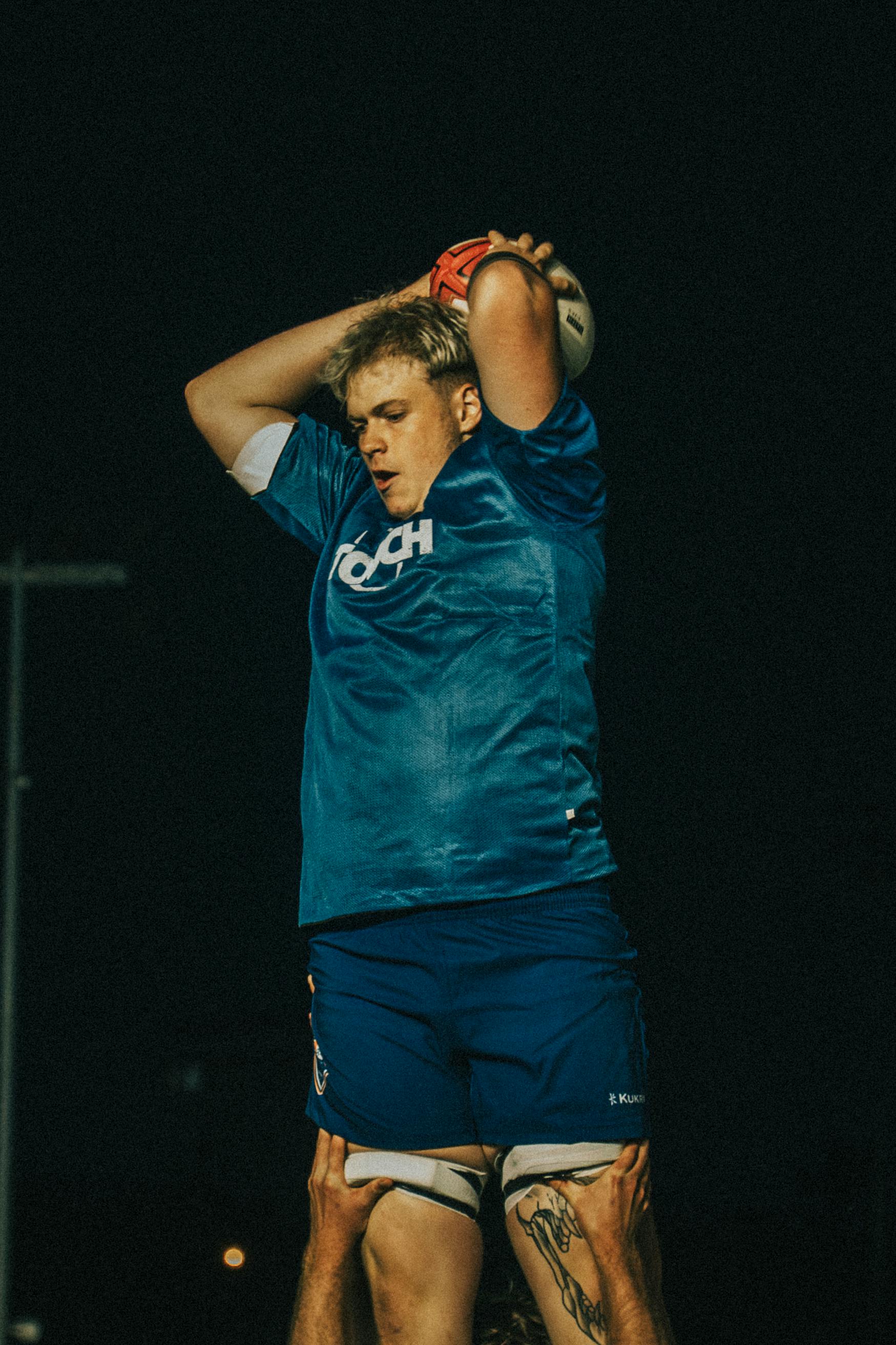 Rugby Player Preparing for Line-Out Throw · Free Stock Photo