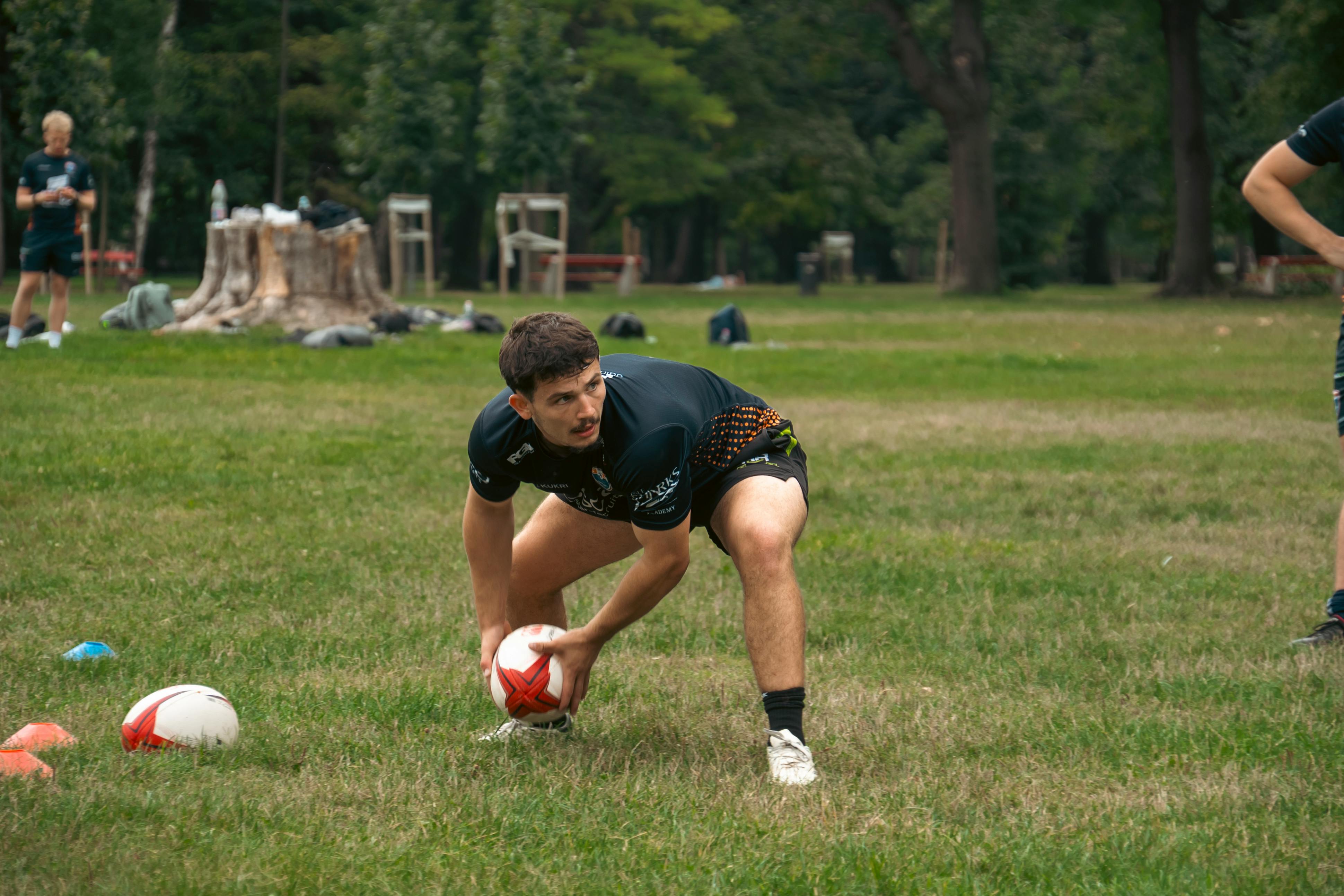 Rugby Practice in Outdoor Park Setting · Free Stock Photo