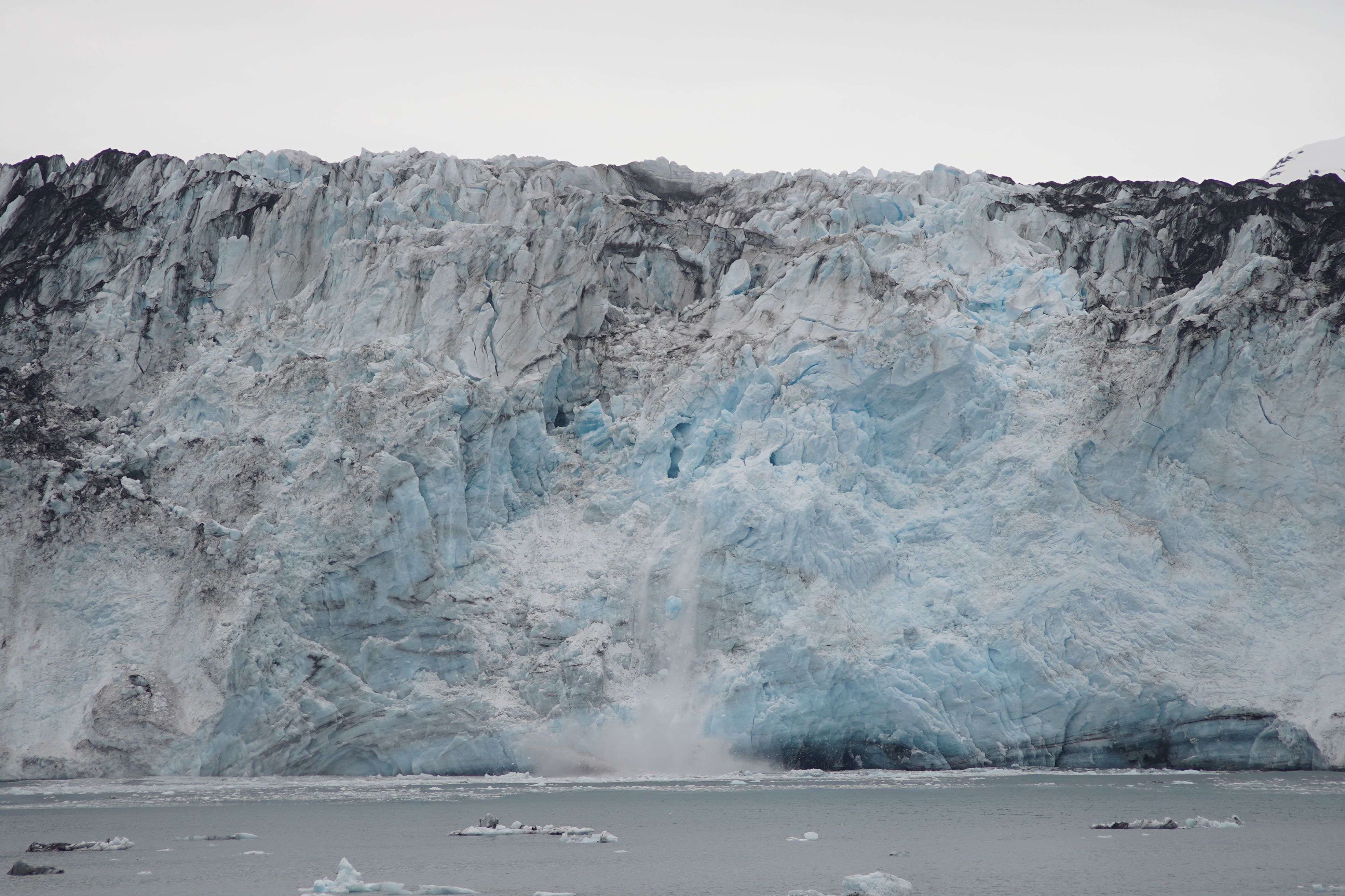 Majestic Glacier Calving in Scenic Landscape · Free Stock Photo