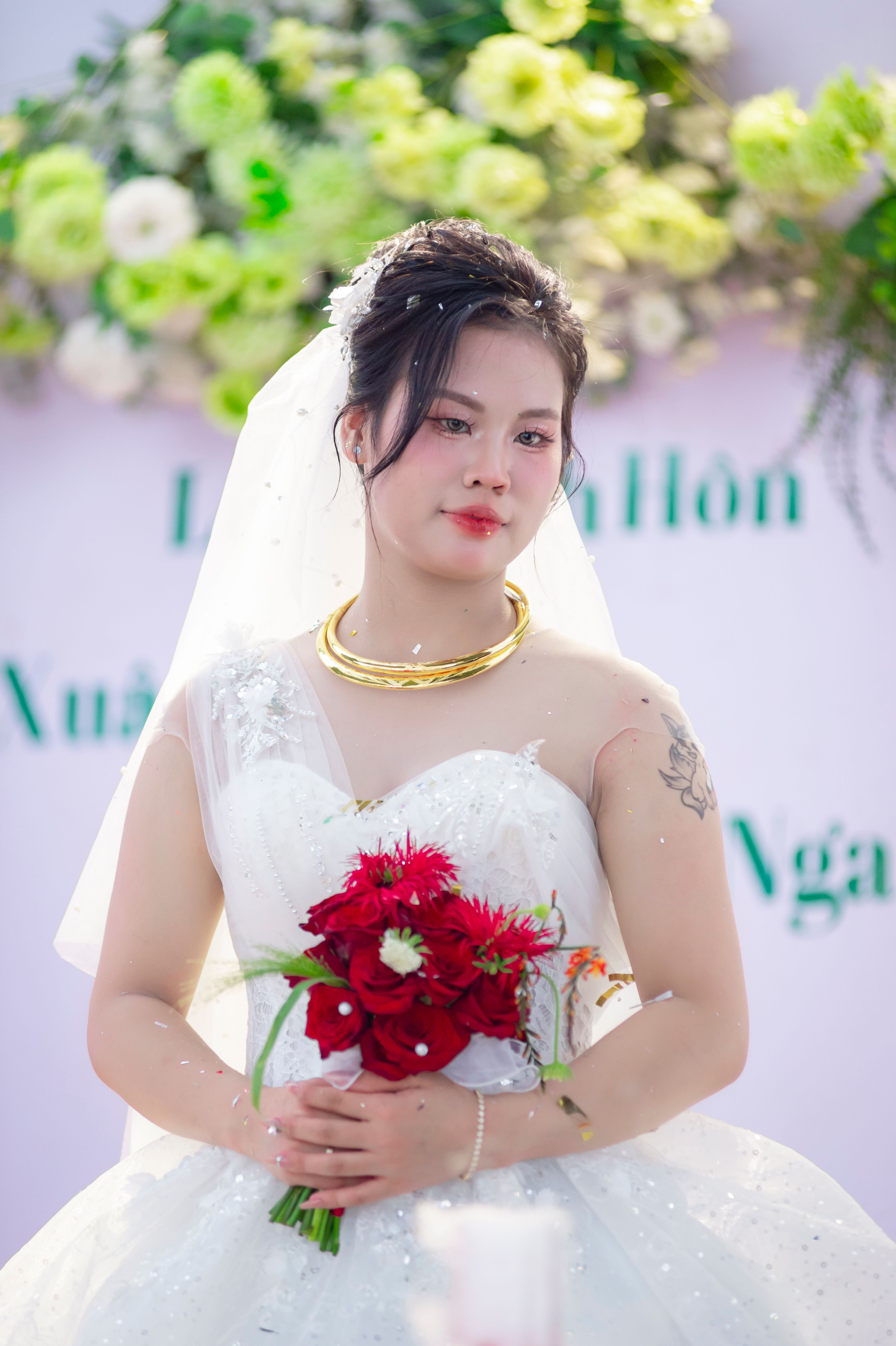 Beautiful Vietnamese Bride Holding Red Bouquet · Free Stock Photo