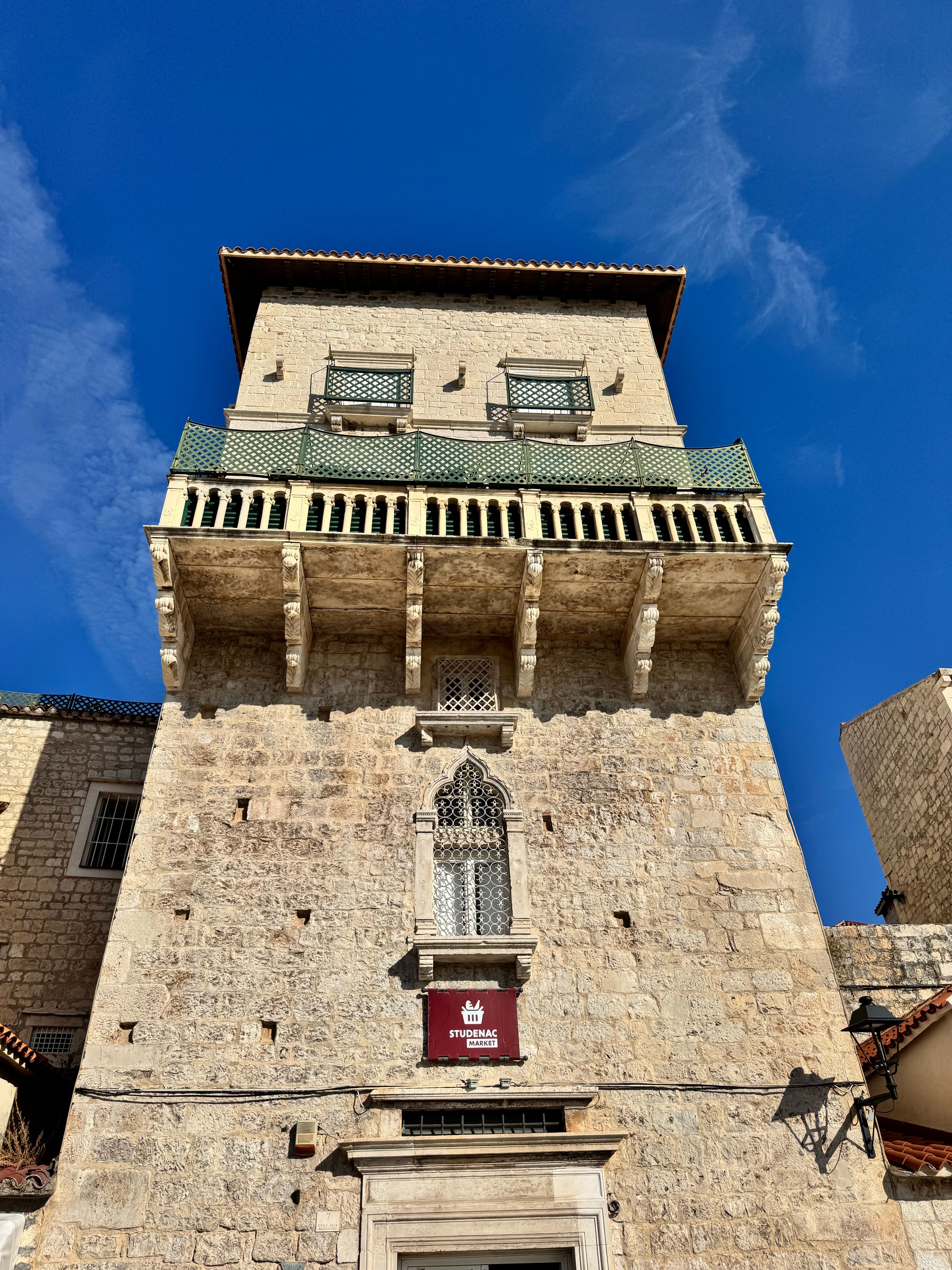 Historic Stone Tower Against Blue Sky · Free Stock Photo