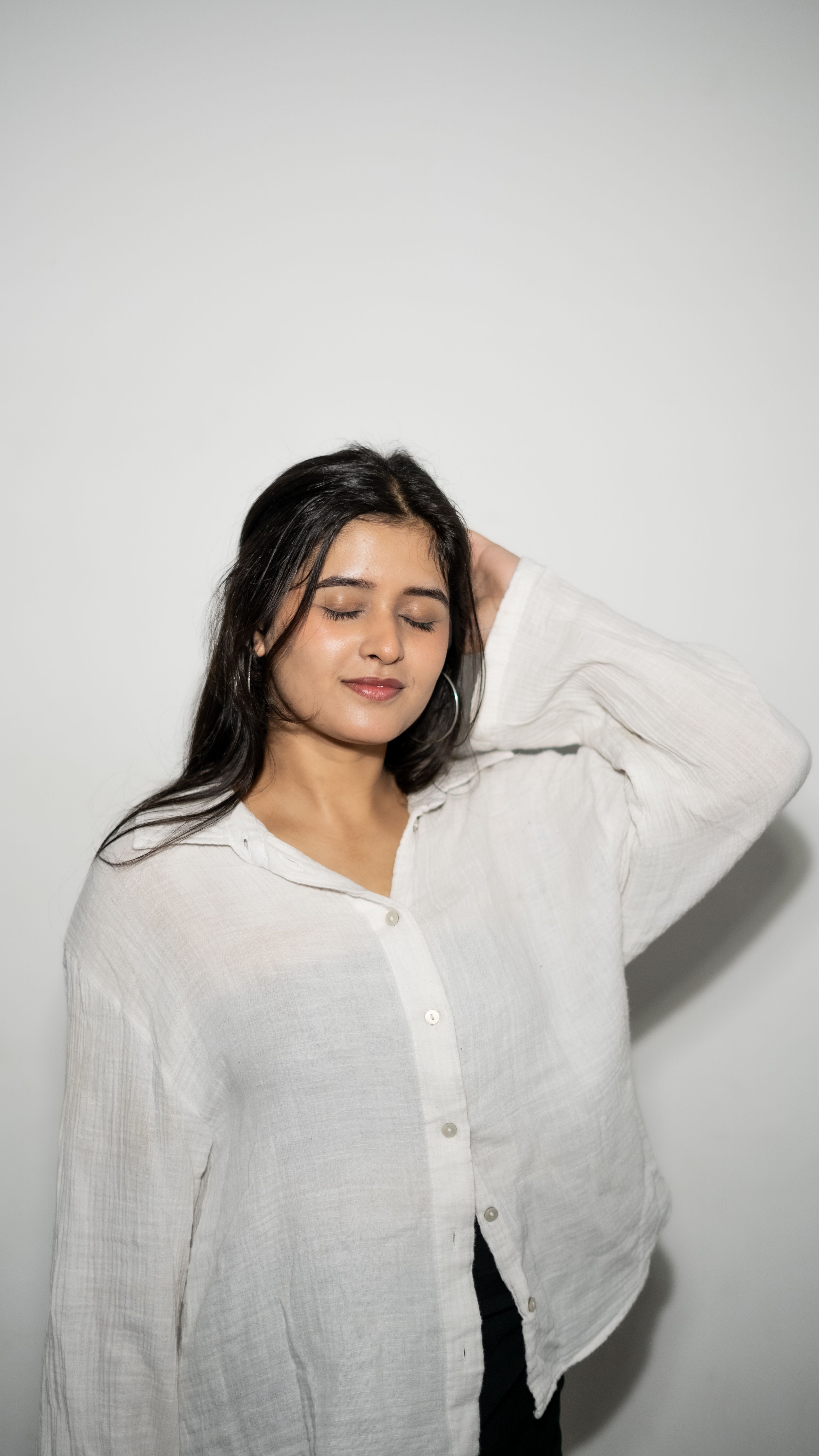 Portrait of a Woman in a White Shirt · Free Stock Photo