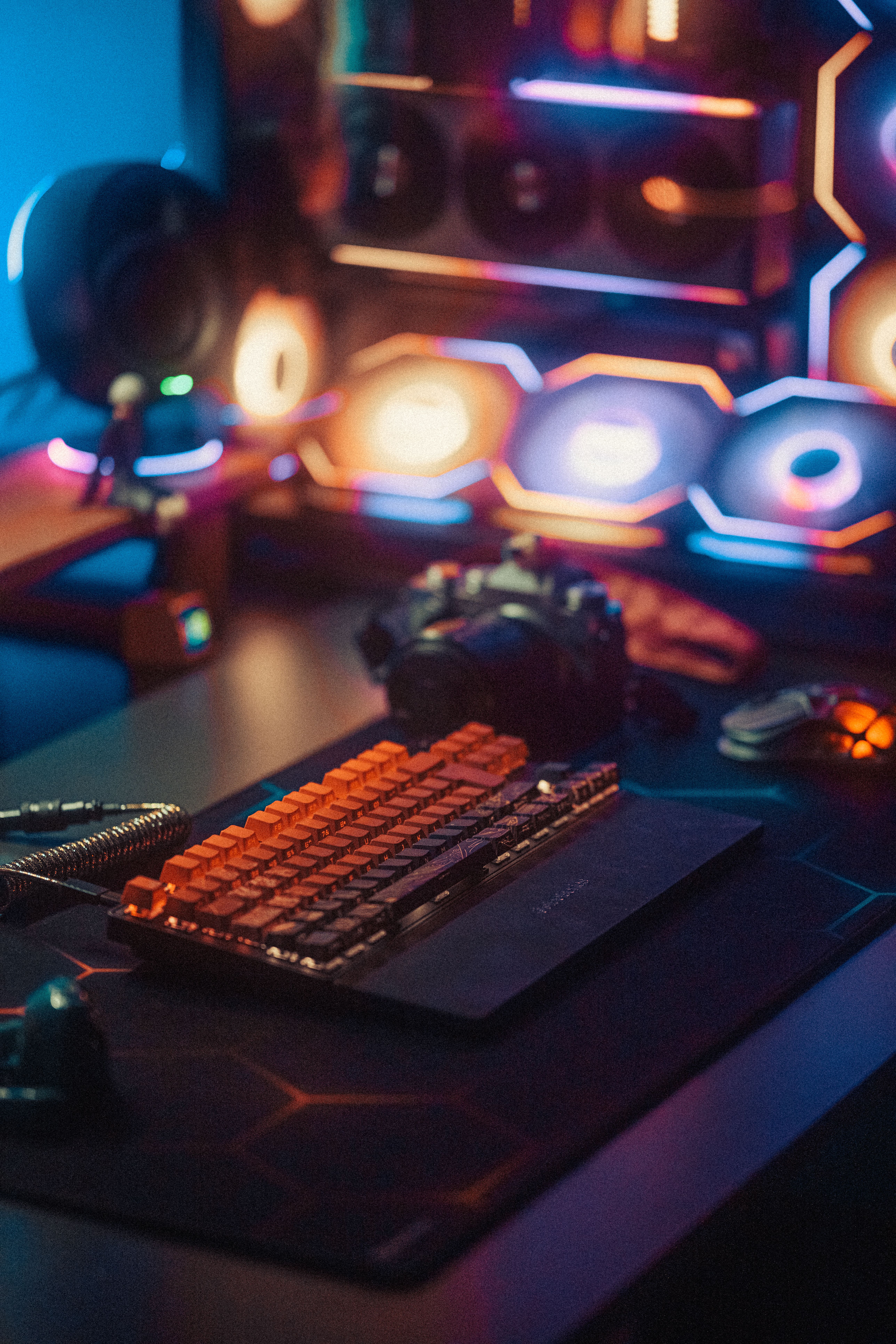 Vibrant Gaming Setup with Keyboard and Camera · Free Stock Photo