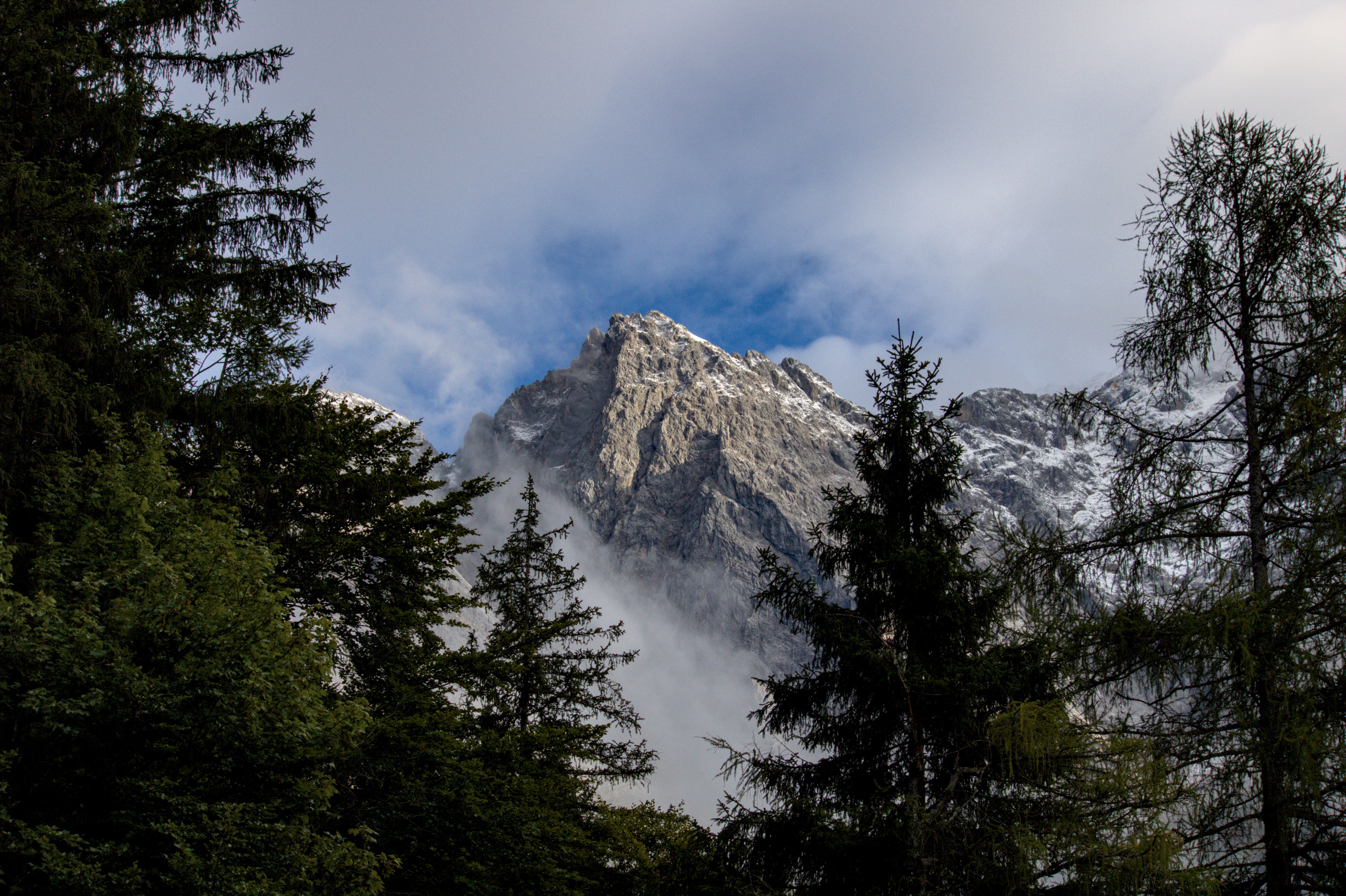 Majestic Mountain Peak Amidst Forest Foliage · Free Stock Photo