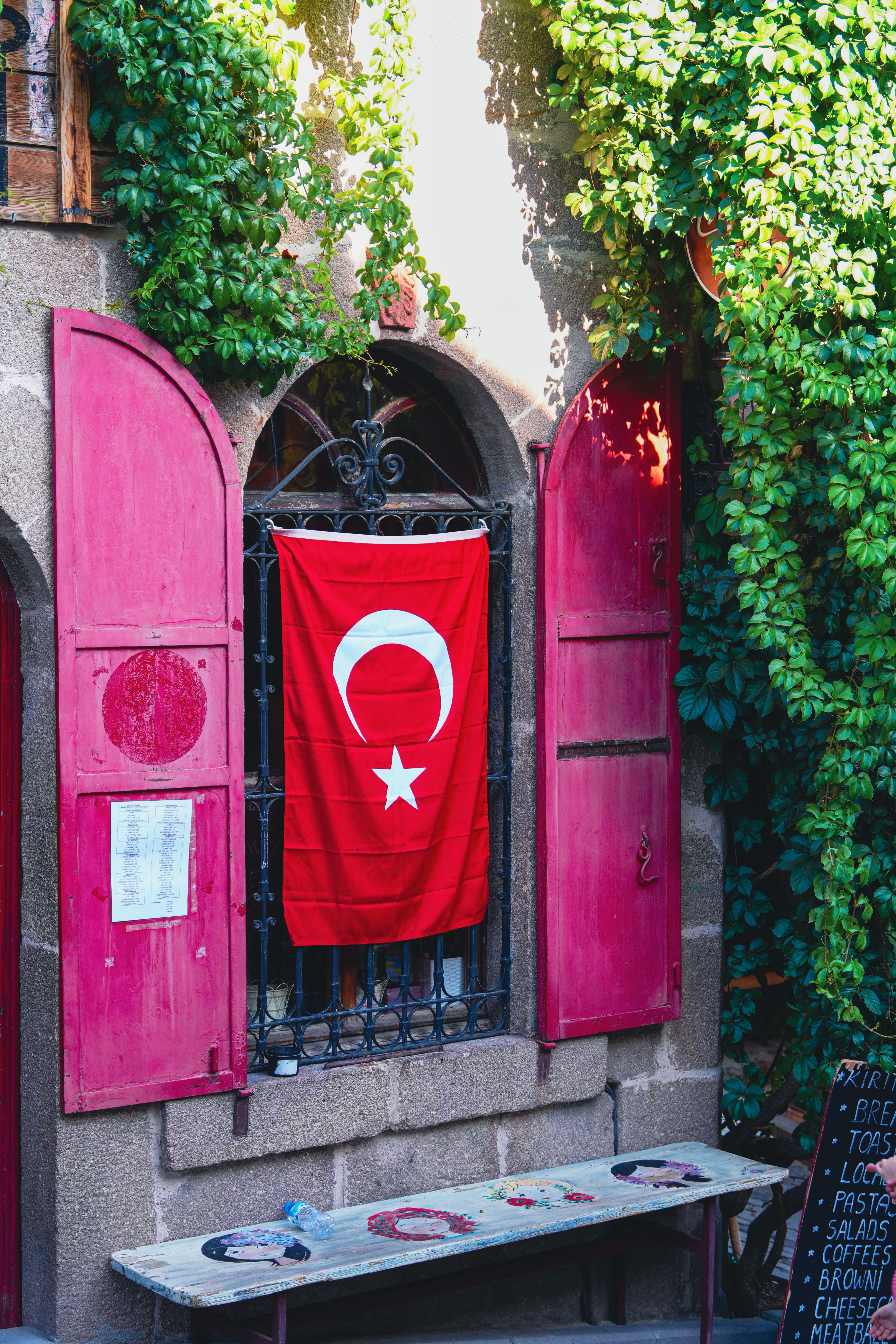 Charming Turkish Street Scene with National Flag · Free Stock Photo