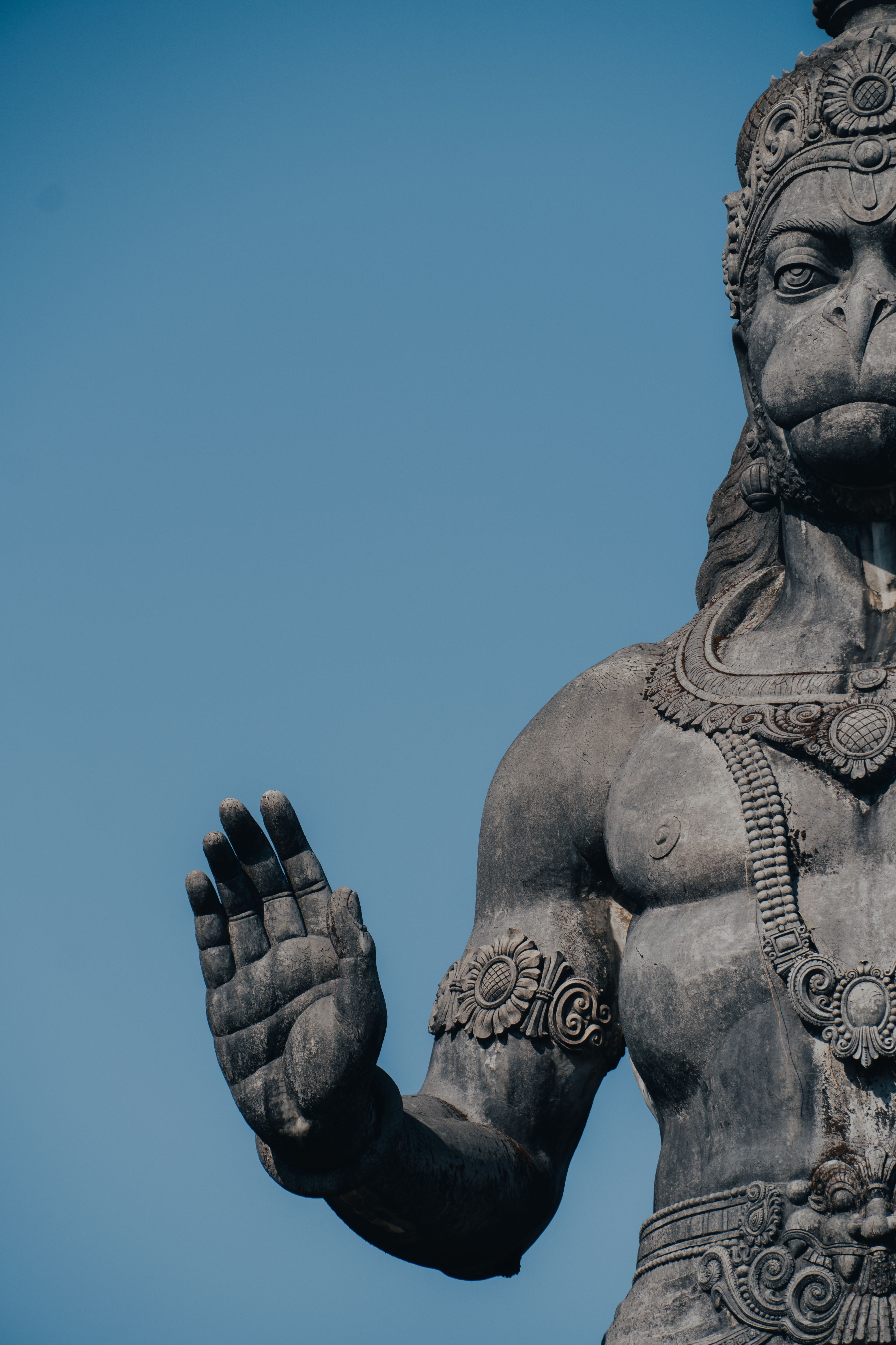 Iconic Hanuman Statue Against Clear Blue Sky · Free Stock Photo