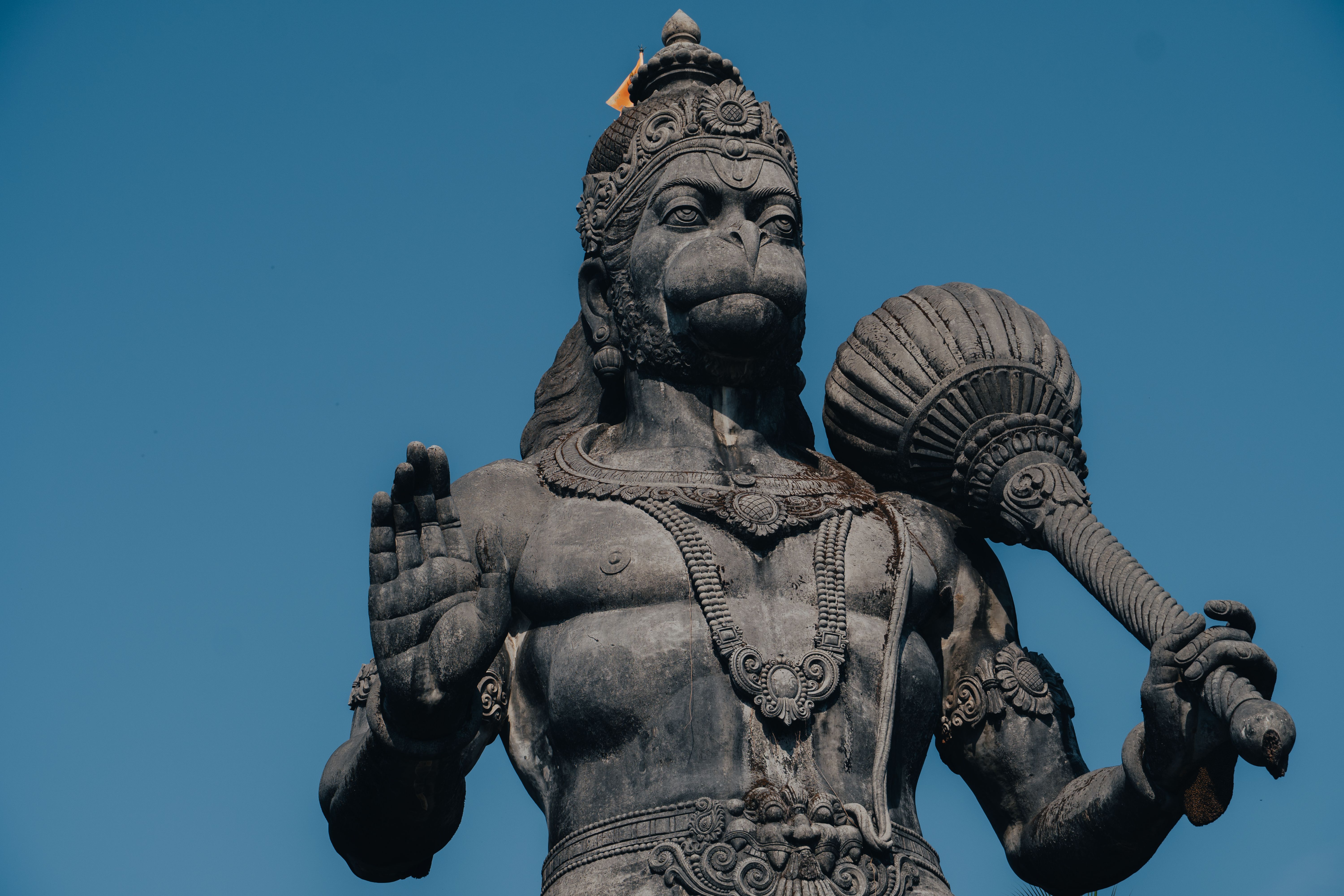 Majestic Statue of Hanuman Against Blue Sky · Free Stock Photo