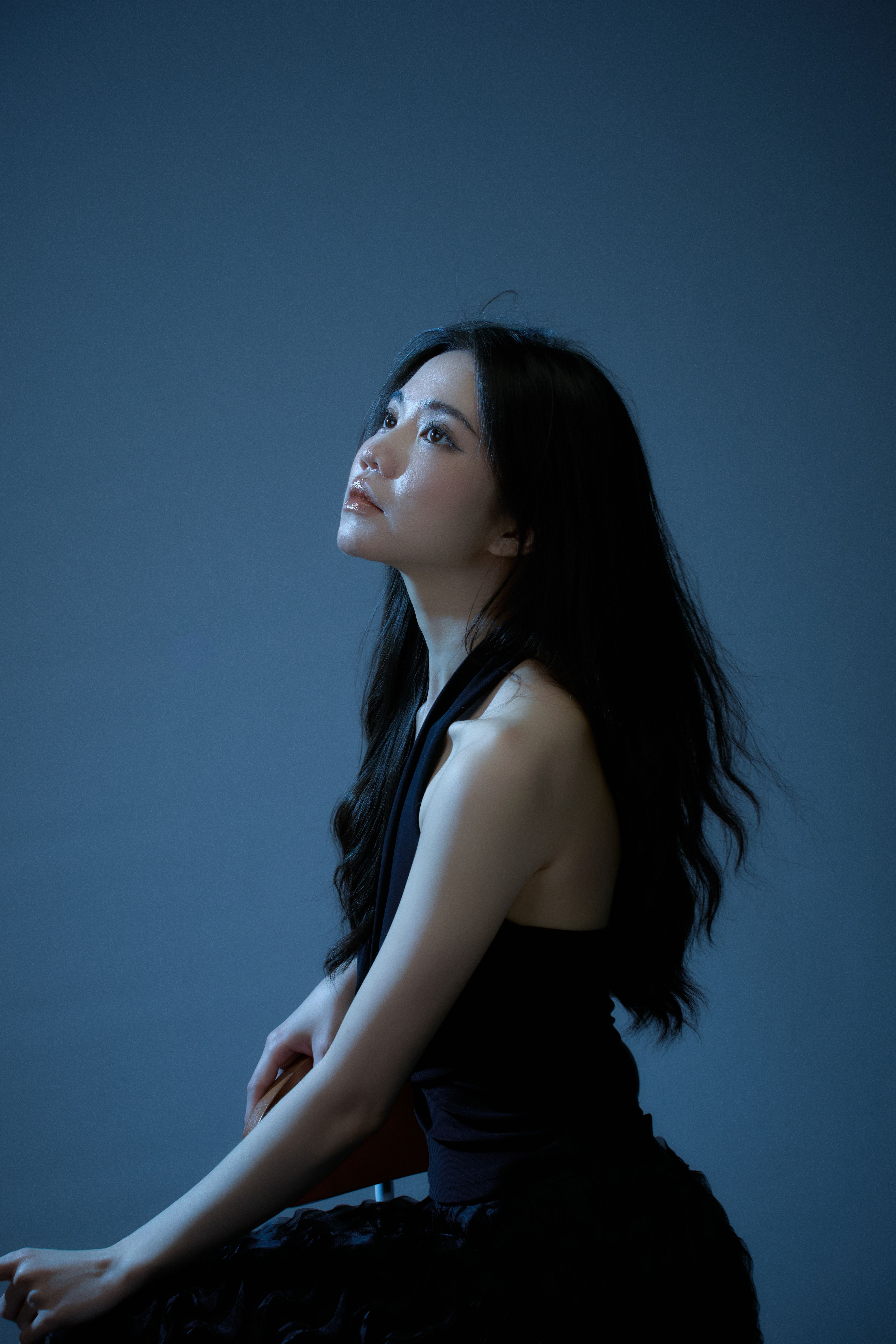 Elegant Portrait of Woman in Low Light Setting · Free Stock Photo