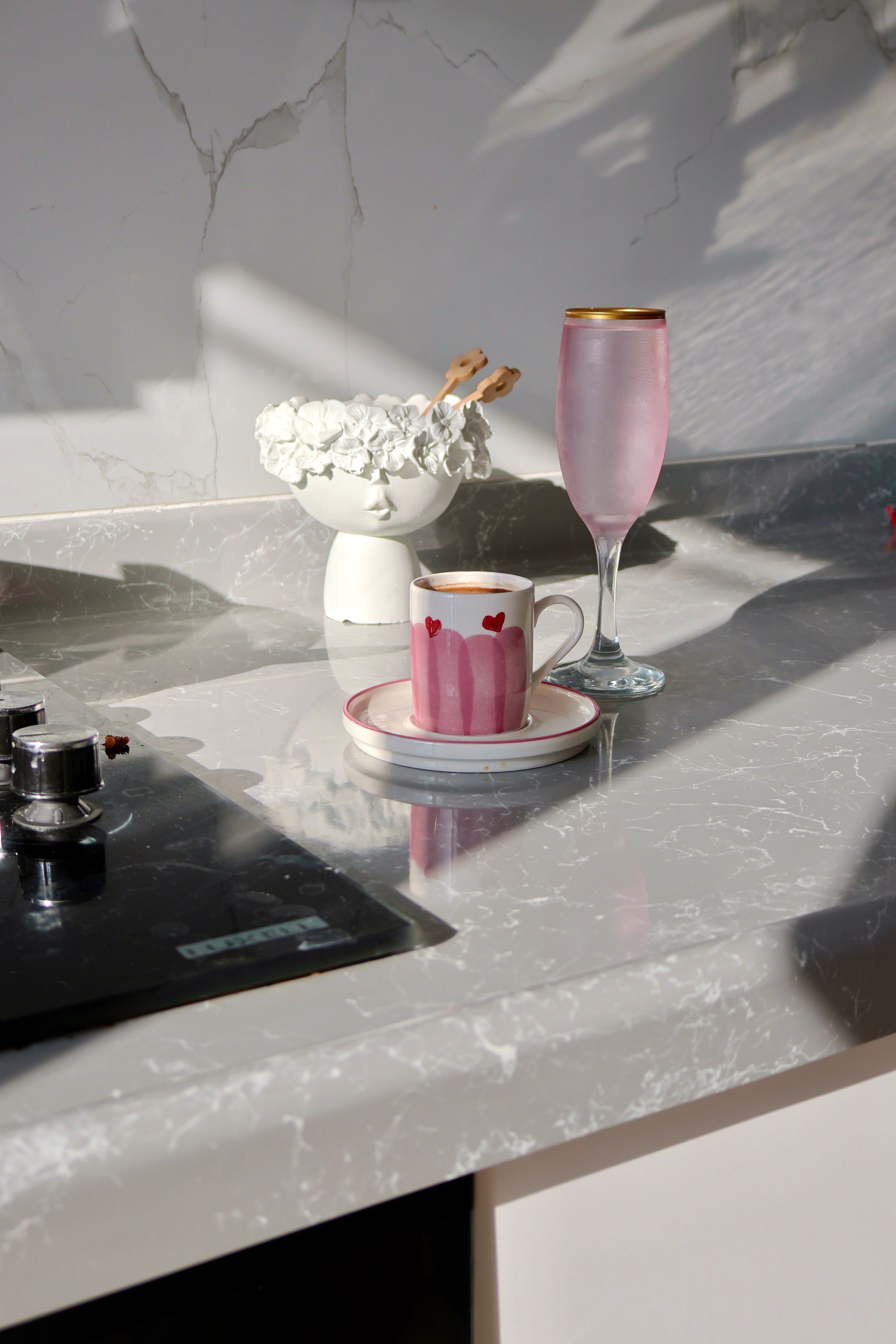 Modern Kitchen Counter with Pink Accents · Free Stock Photo