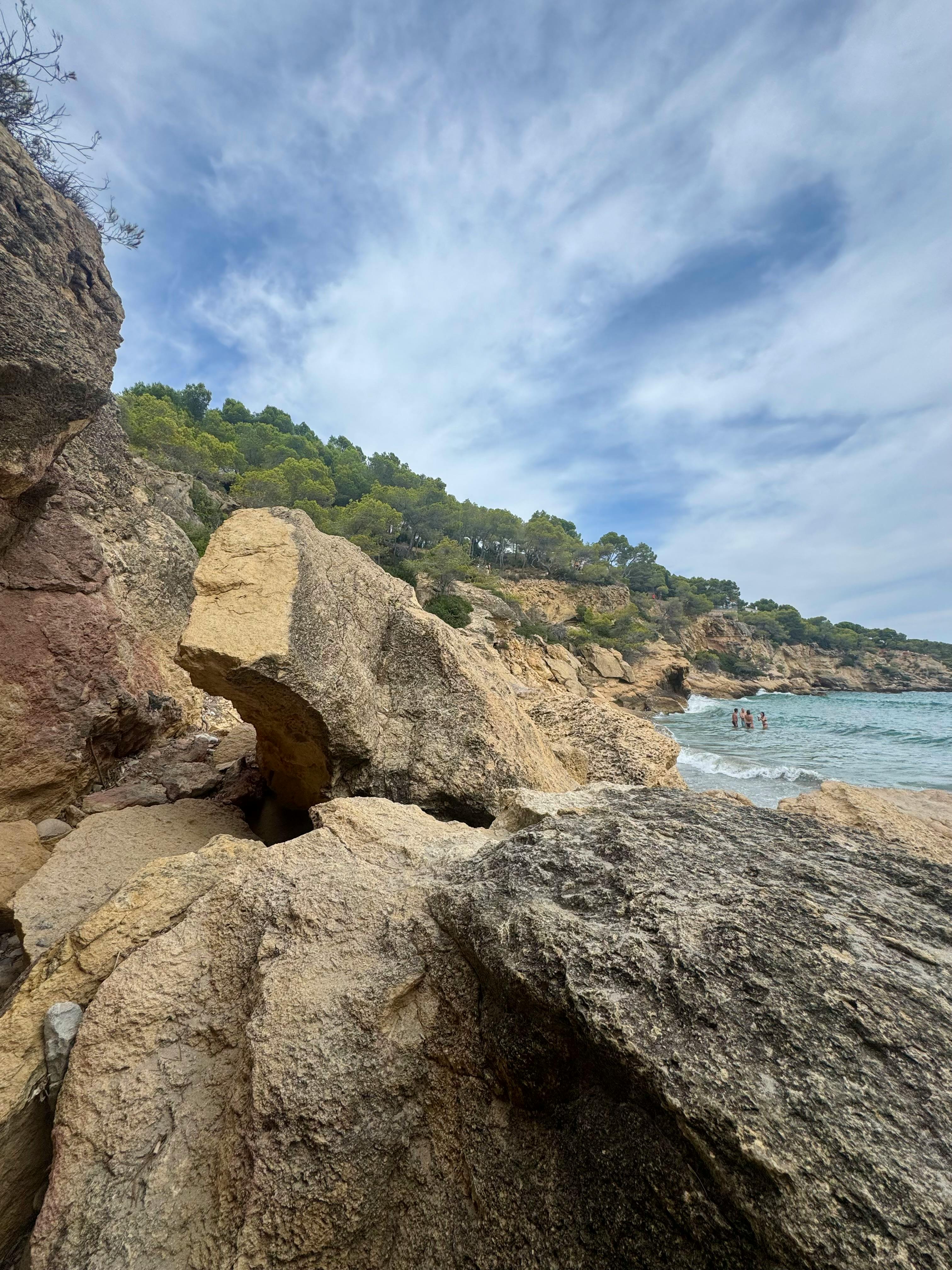 Rocky Coastline with Scenic Beach View · Free Stock Photo