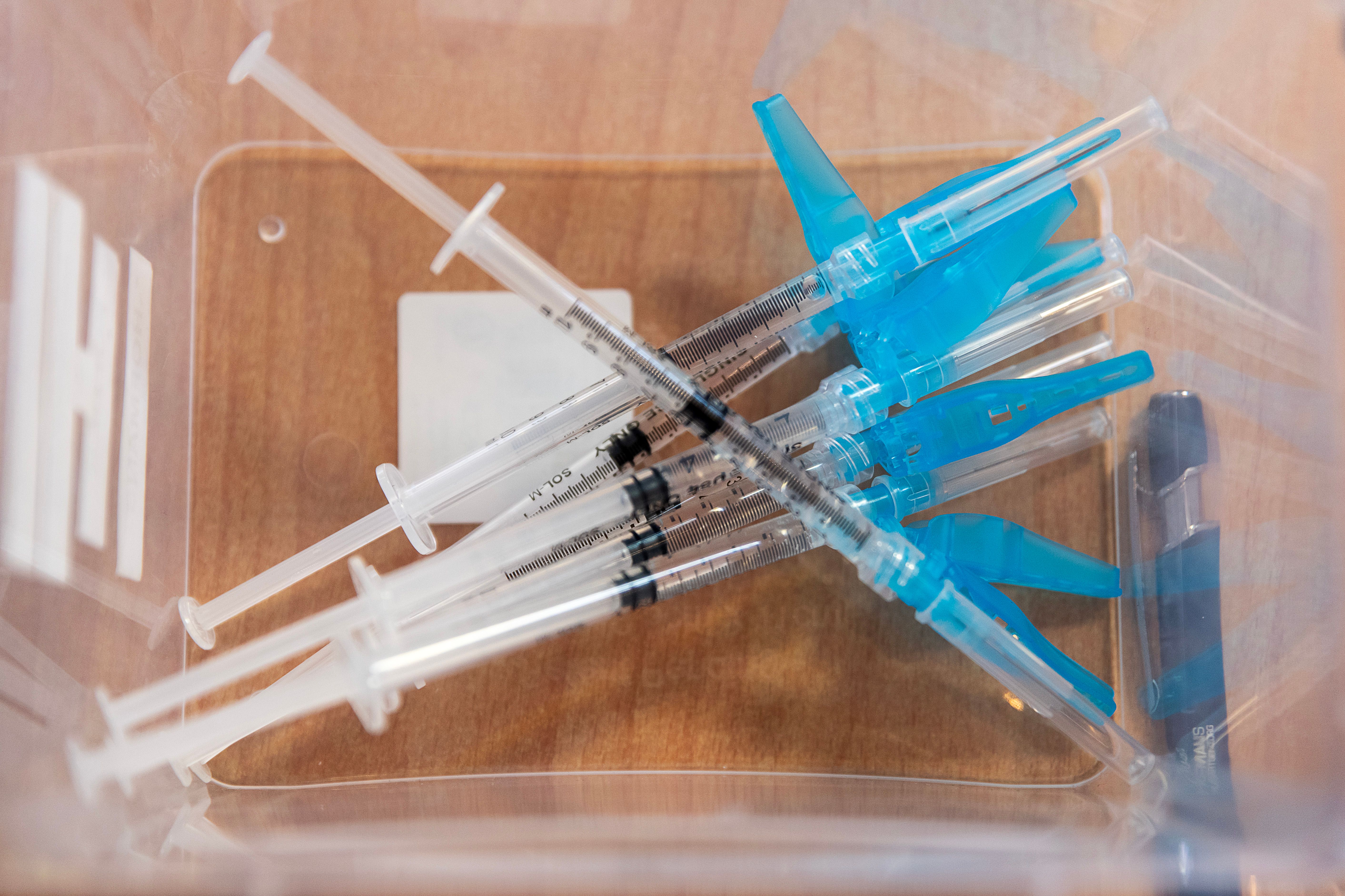 Disposable Syringes in a Medical Container · Free Stock Photo