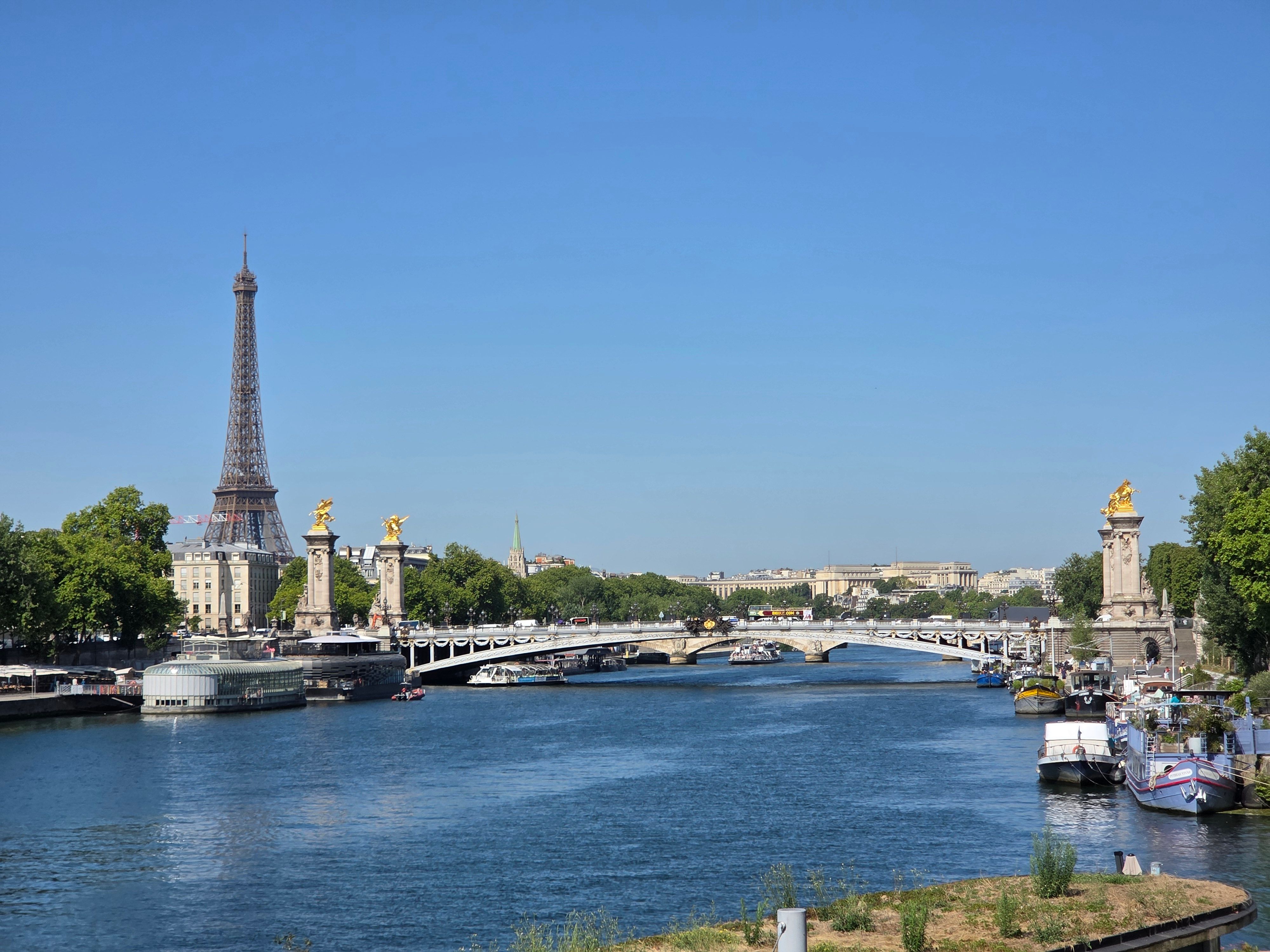 Eiffel Tower and Seine River on a Sunny Day · Free Stock Photo