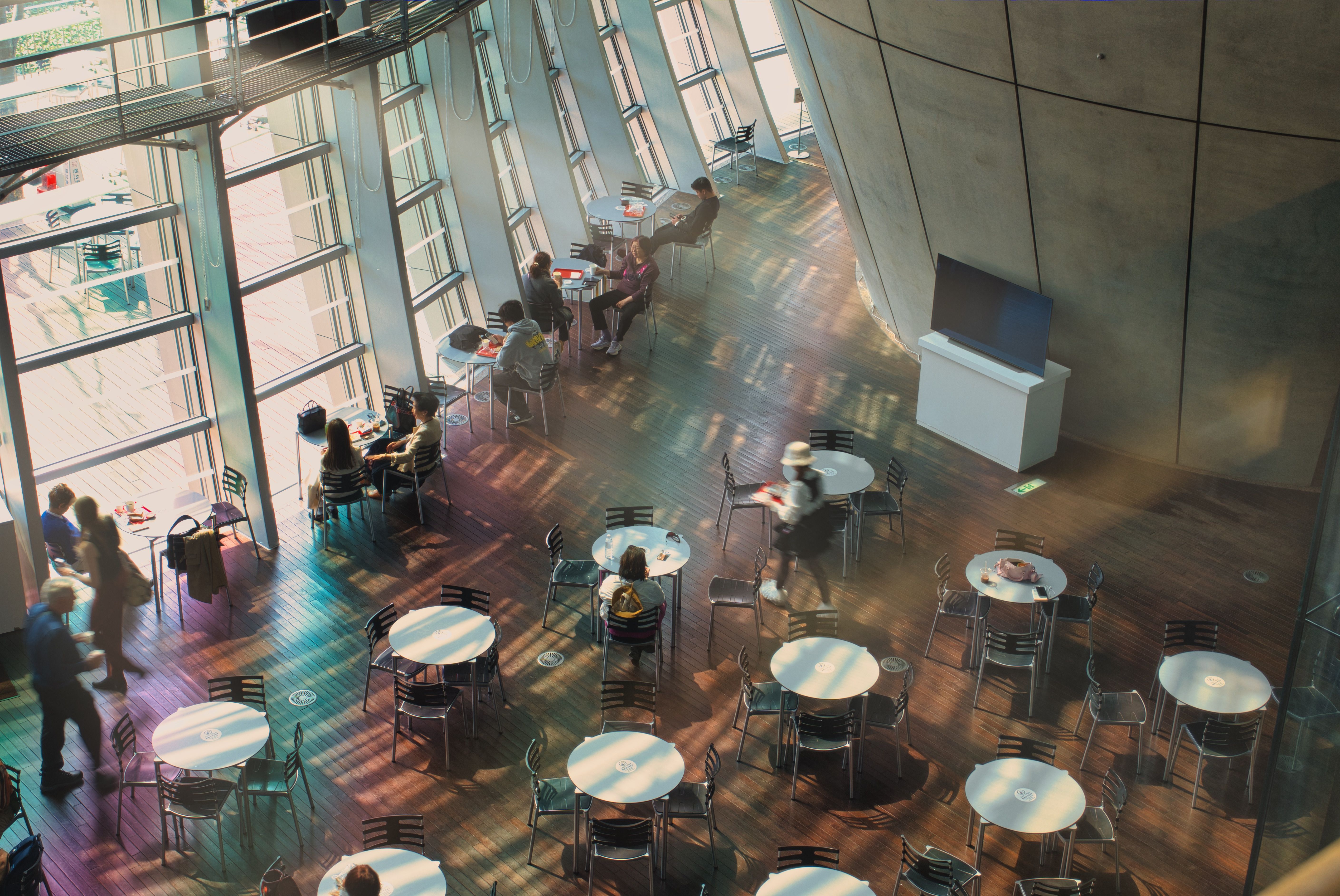 Contemporary Indoor Cafe with Natural Light · Free Stock Photo