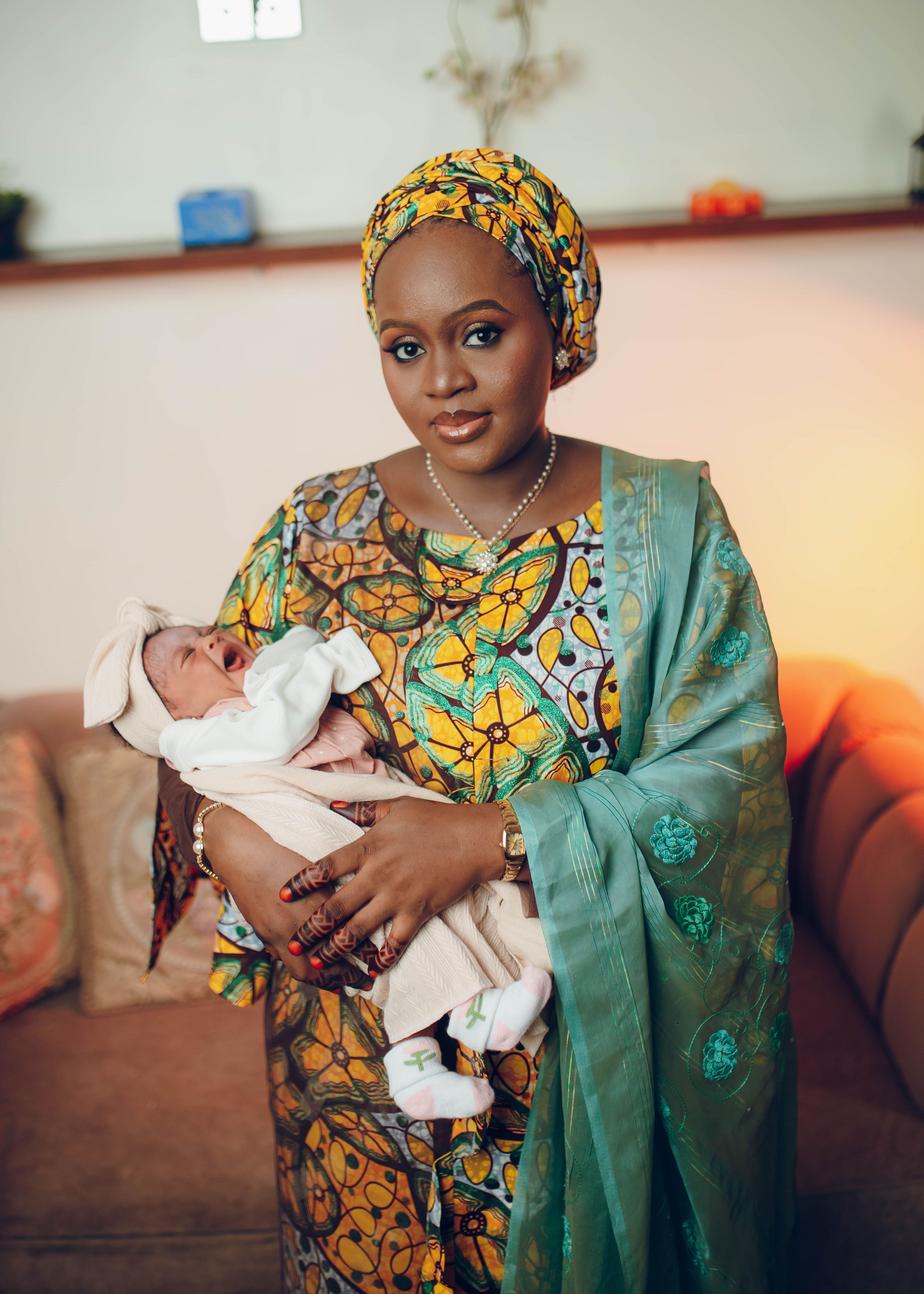 Traditional Nigerian Mother Holding Newborn · Free Stock Photo
