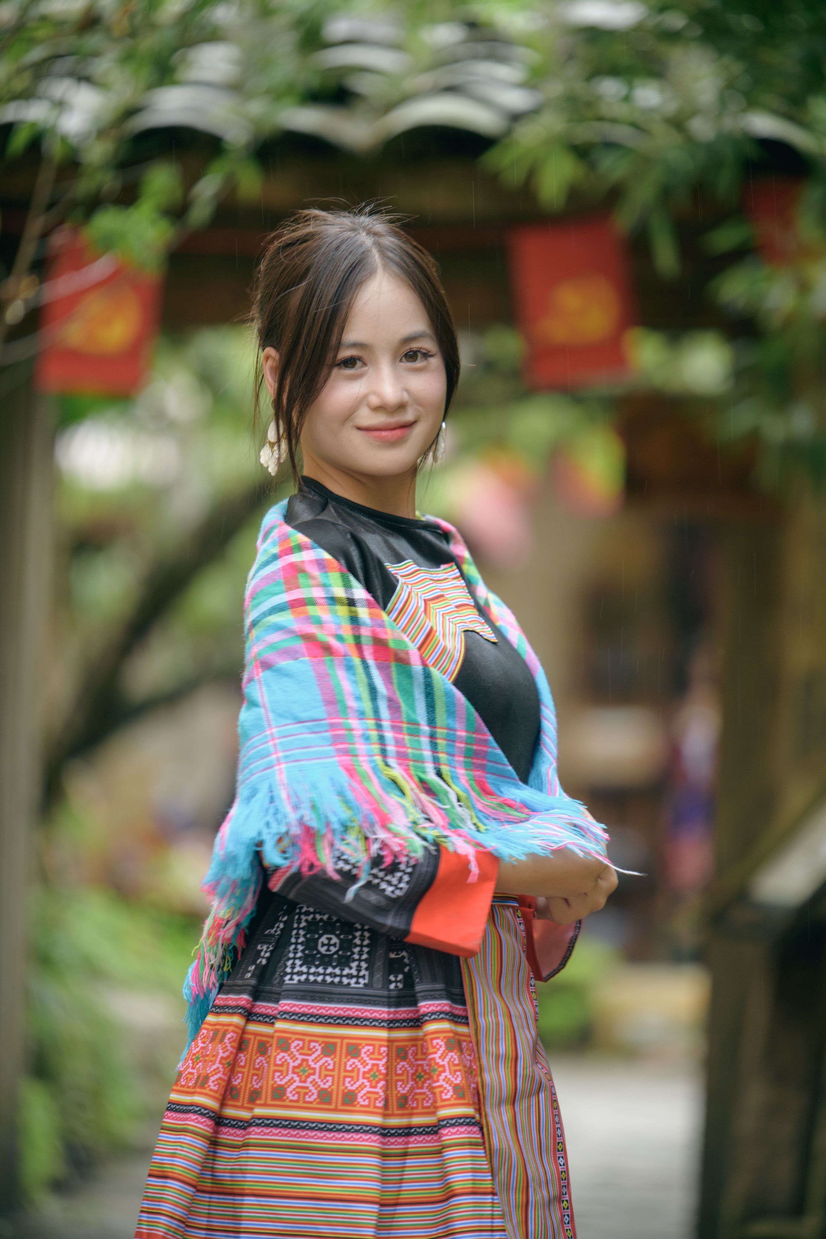Young Woman in Traditional Colorful Attire Outdoors · Free Stock Photo