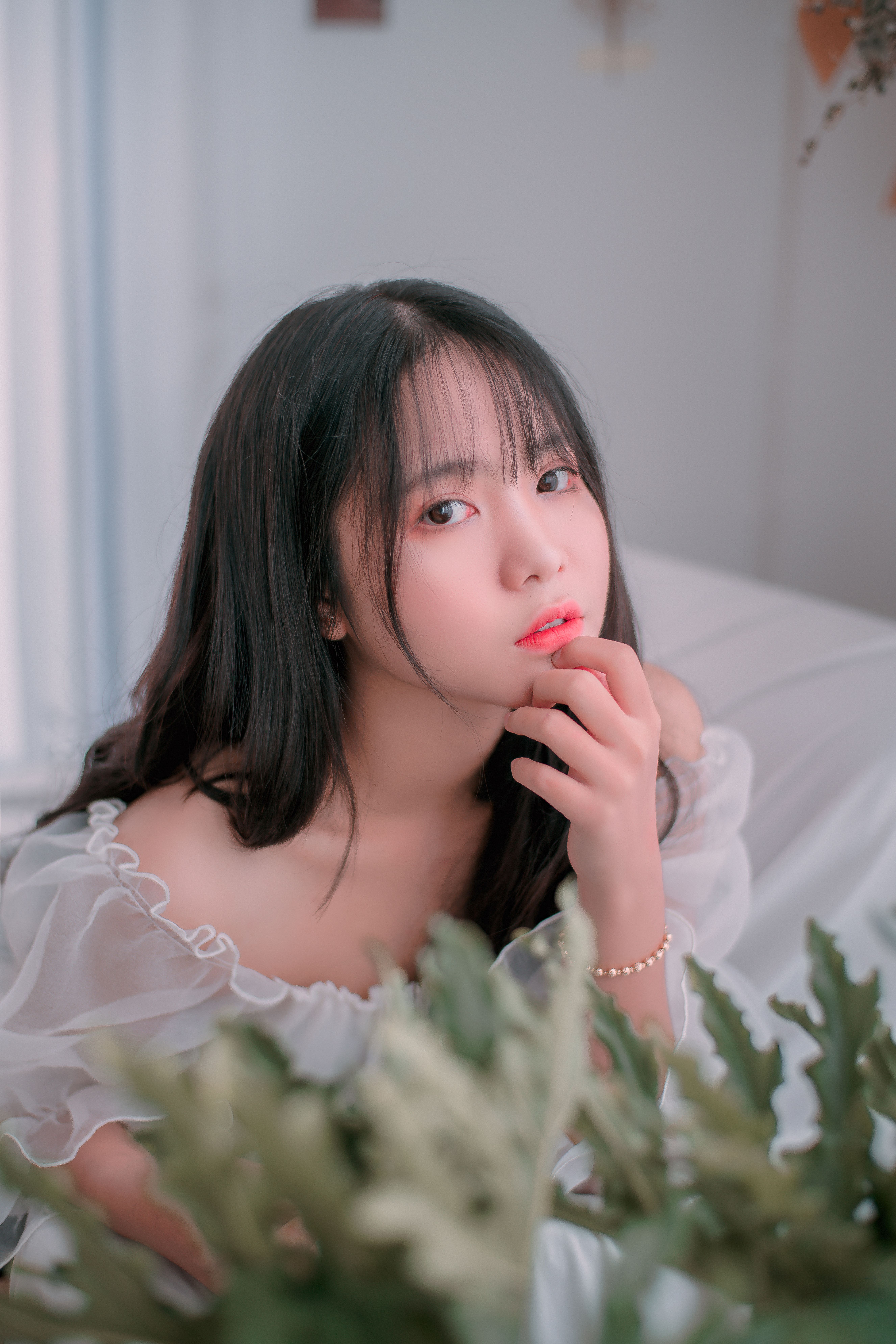 Elegant Portrait of a Young Woman with a Dreamy Gaze · Free Stock Photo