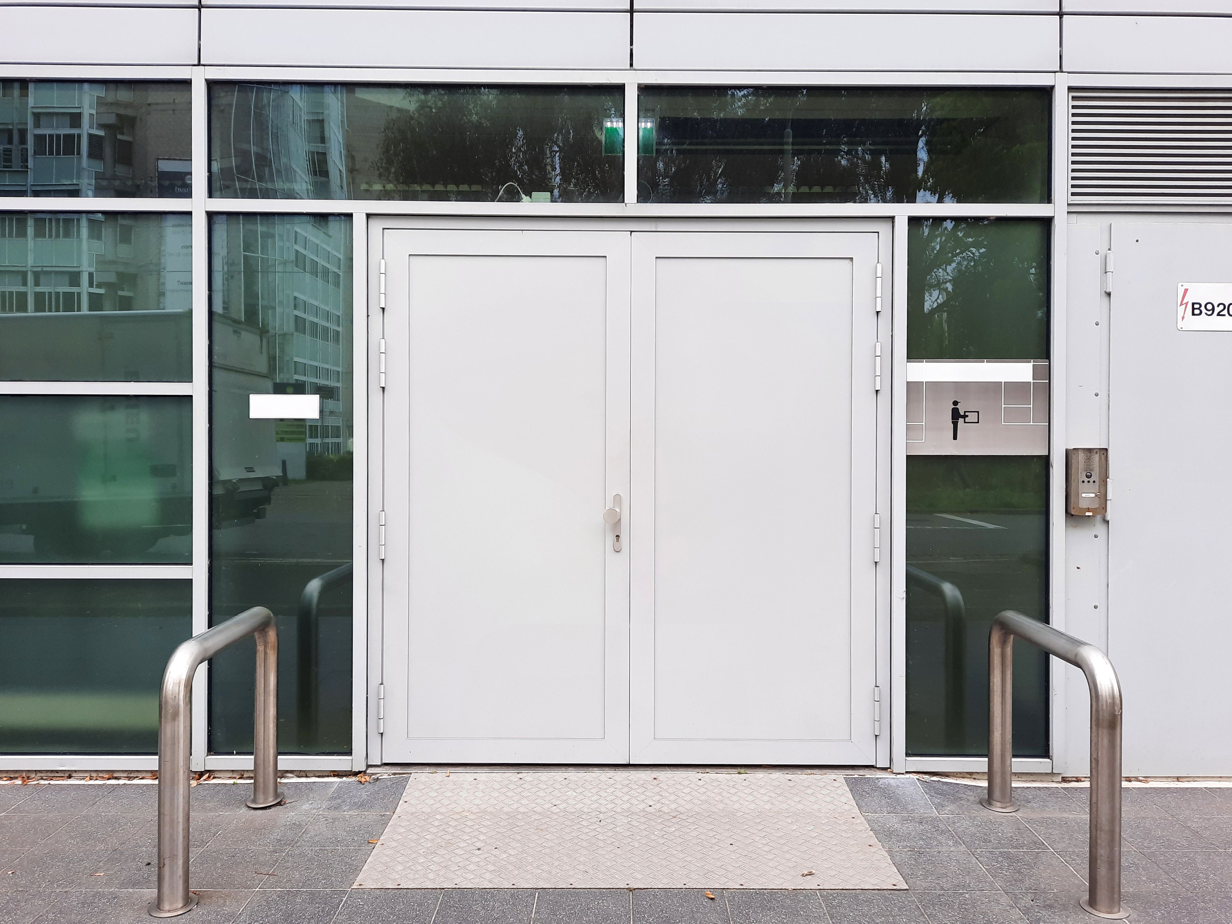 Modern Glass Building Entrance with Double Doors · Free Stock Photo