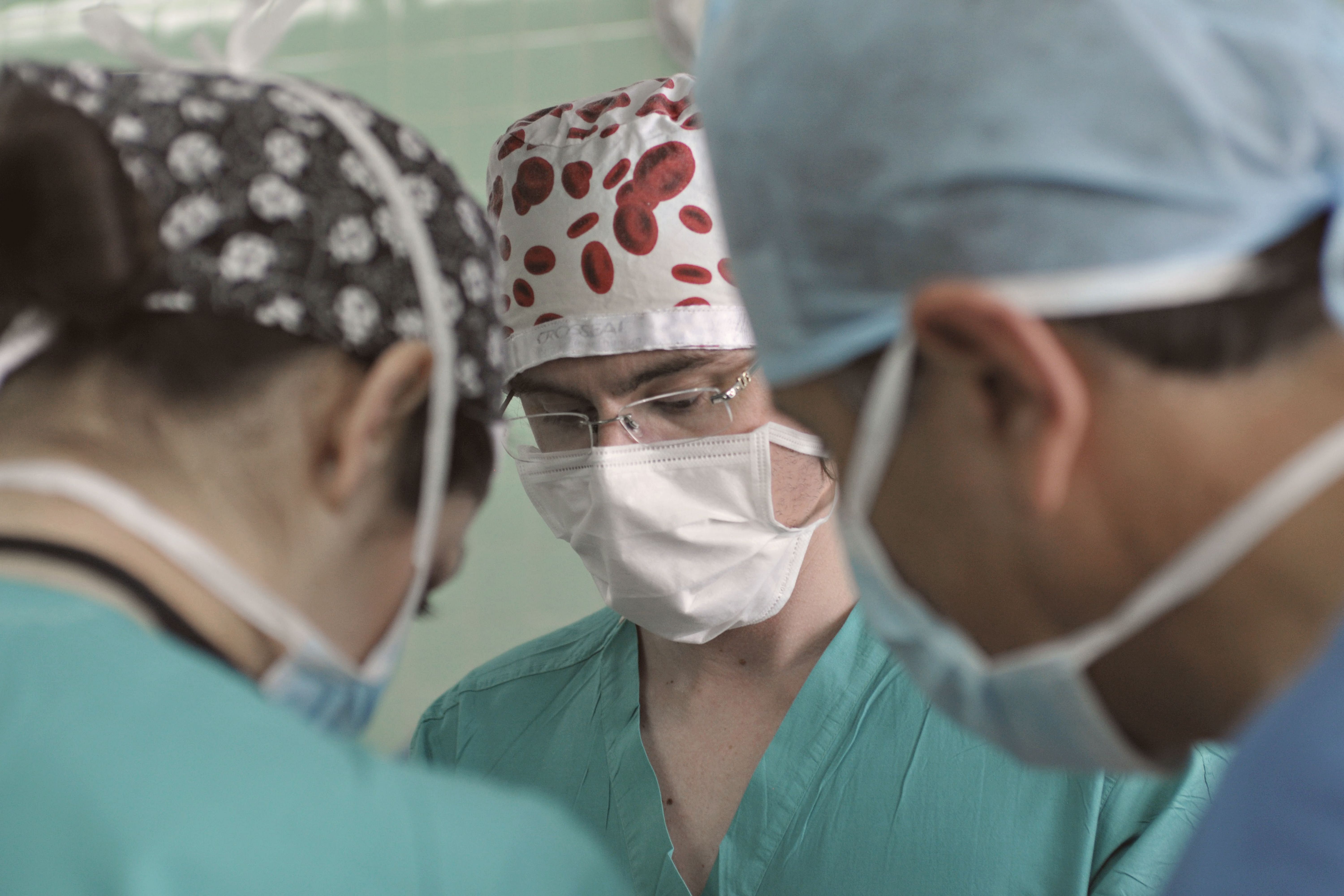 Medical Team Performing Surgery in Hospital · Free Stock Photo