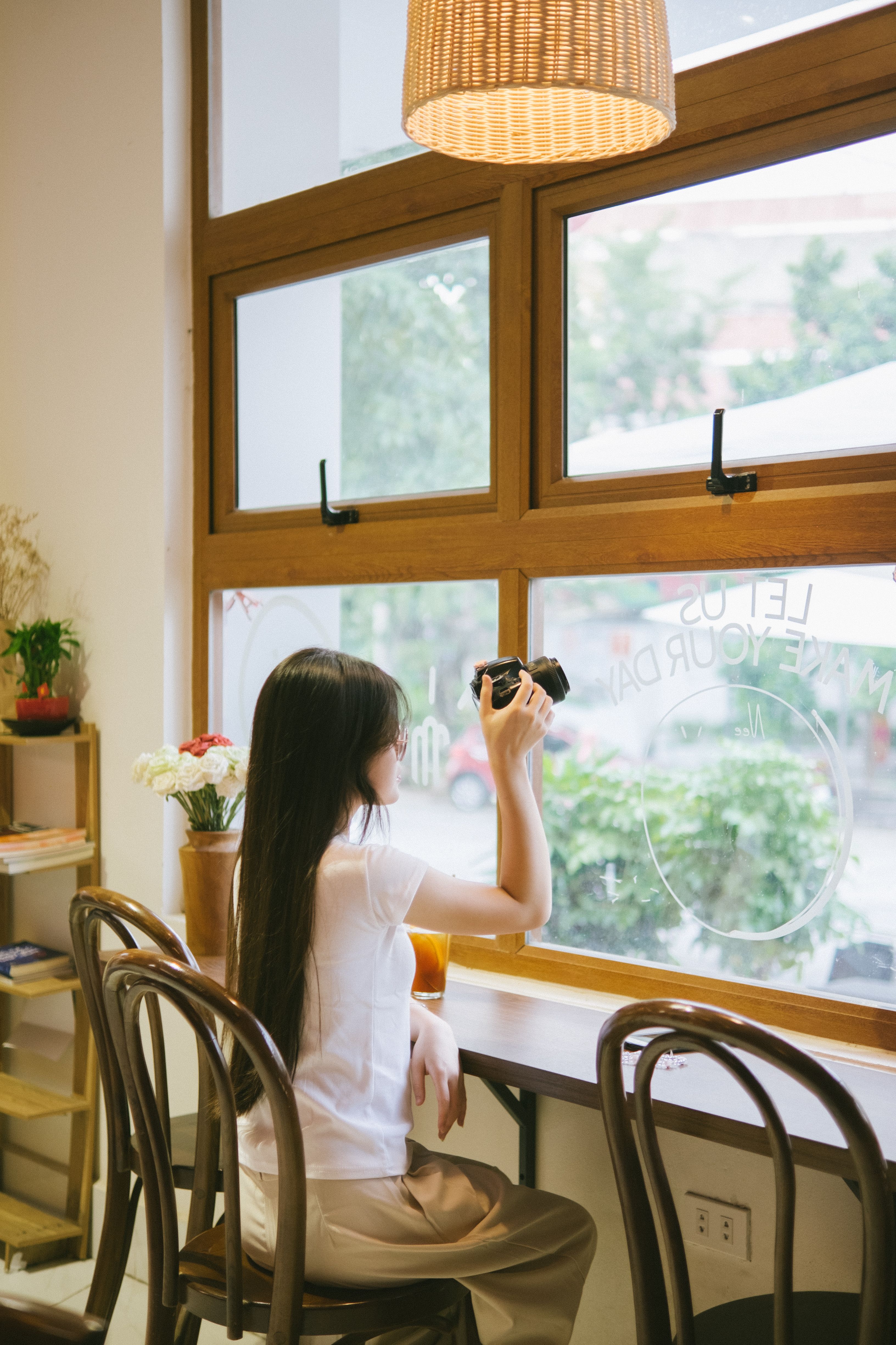 Woman Enjoying Morning Tea by Window Light · Free Stock Photo