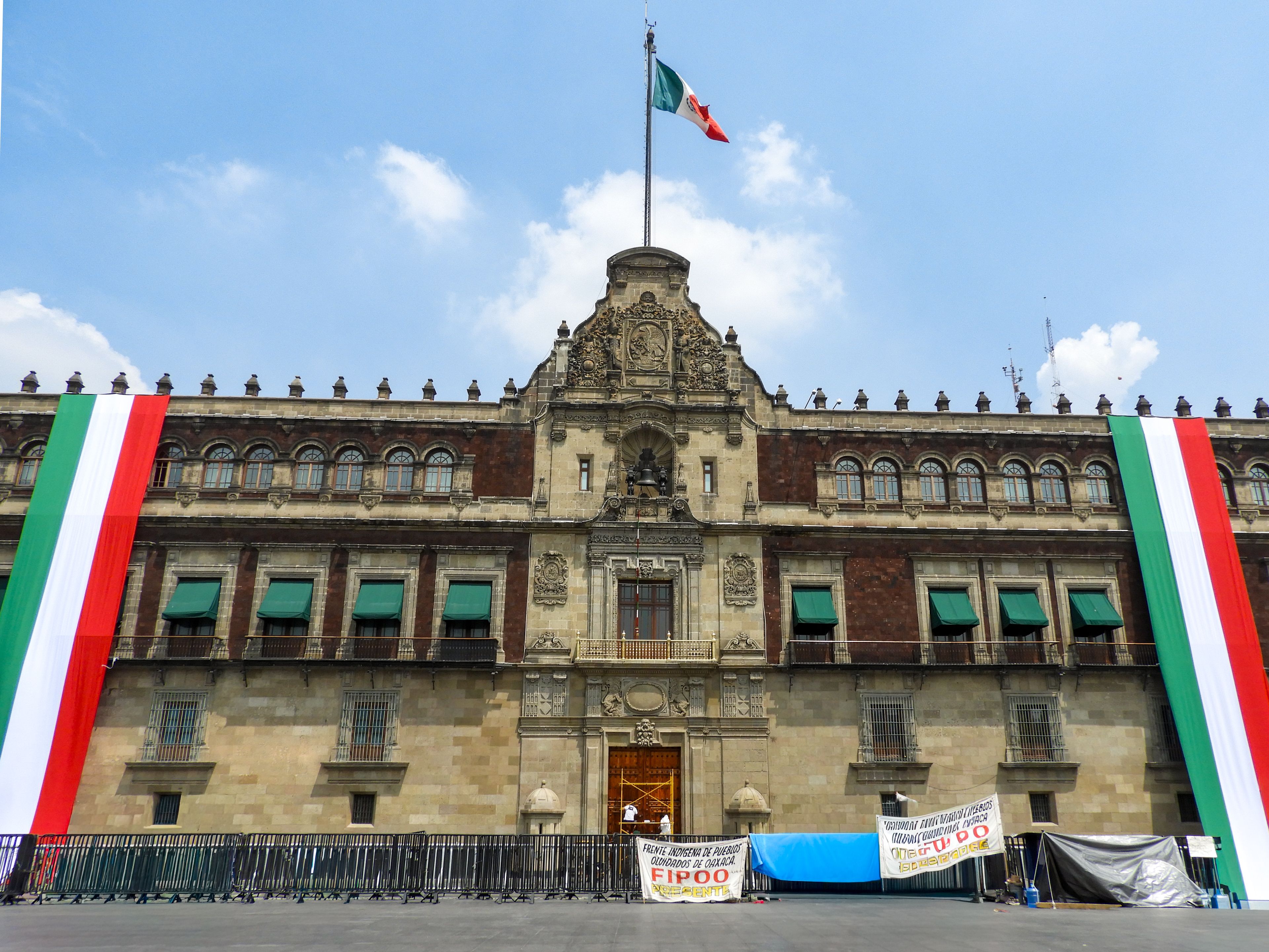 Mexican National Palace with Flags in Mexico City · Free Stock Photo