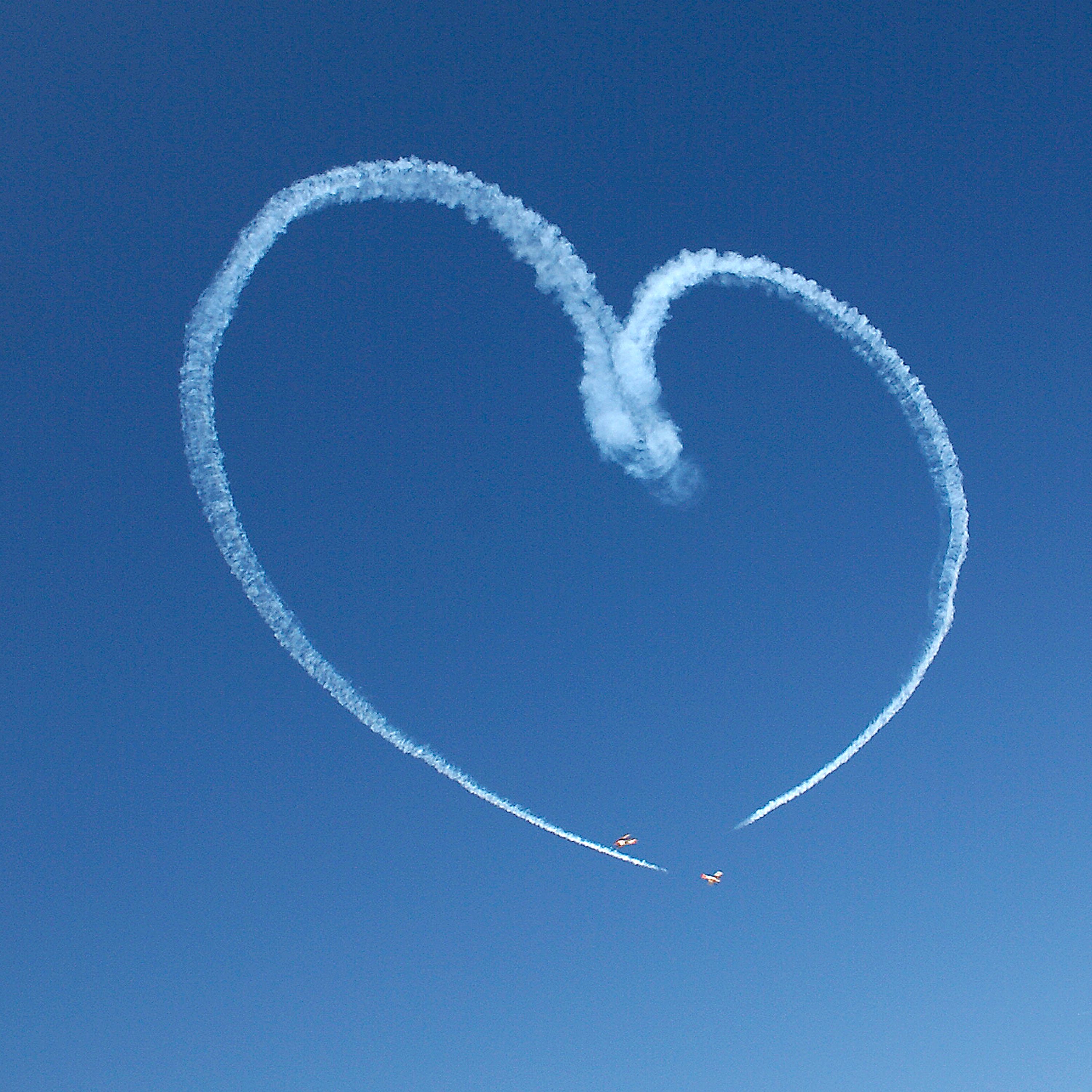 Aerobatic Plane Smoke Heart in Blue Sky · Free Stock Photo