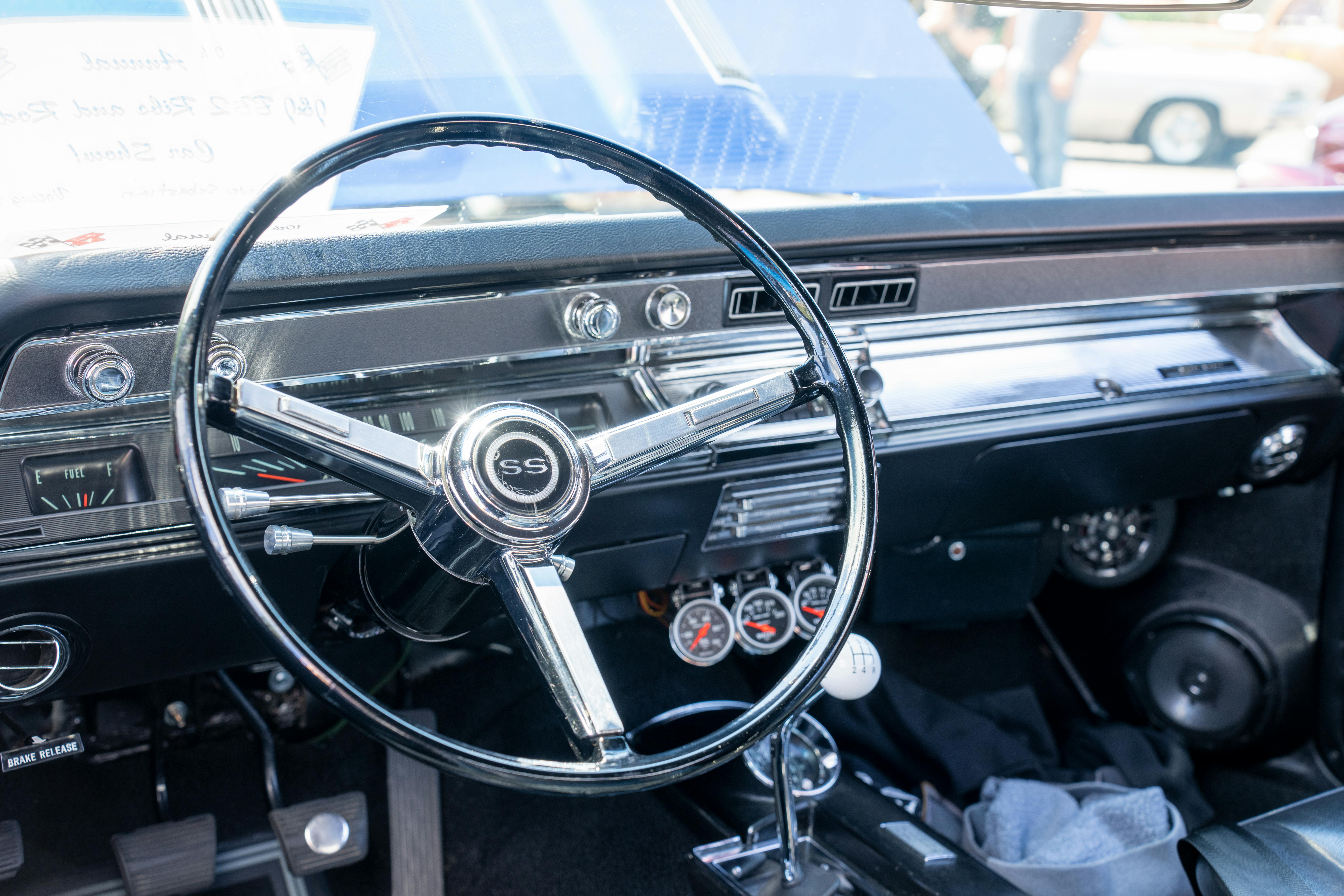 Vintage Car Interior with SS Steering Wheel · Free Stock Photo