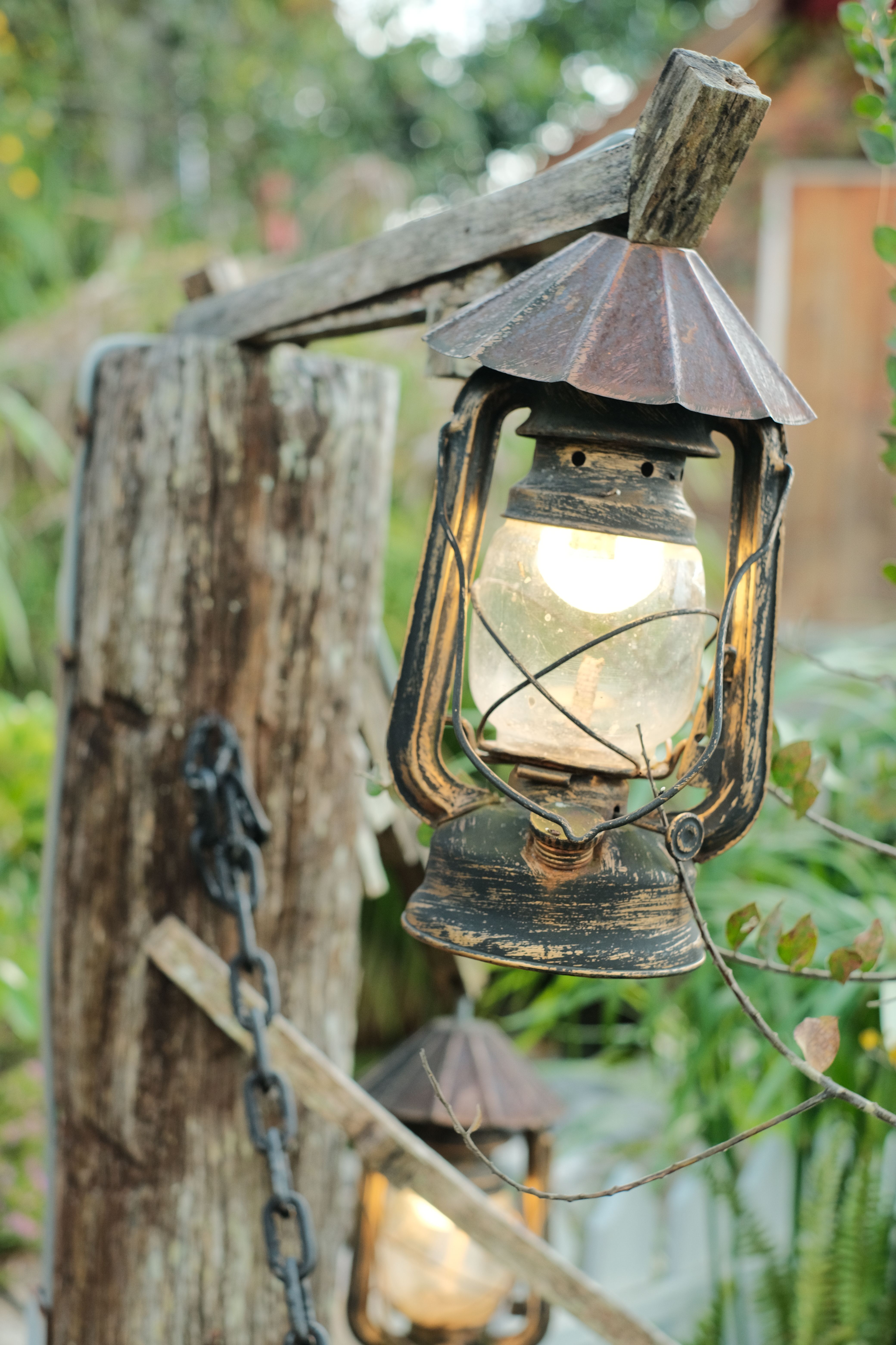Rustic Lanterns Hanging Outdoors in Garden · Free Stock Photo