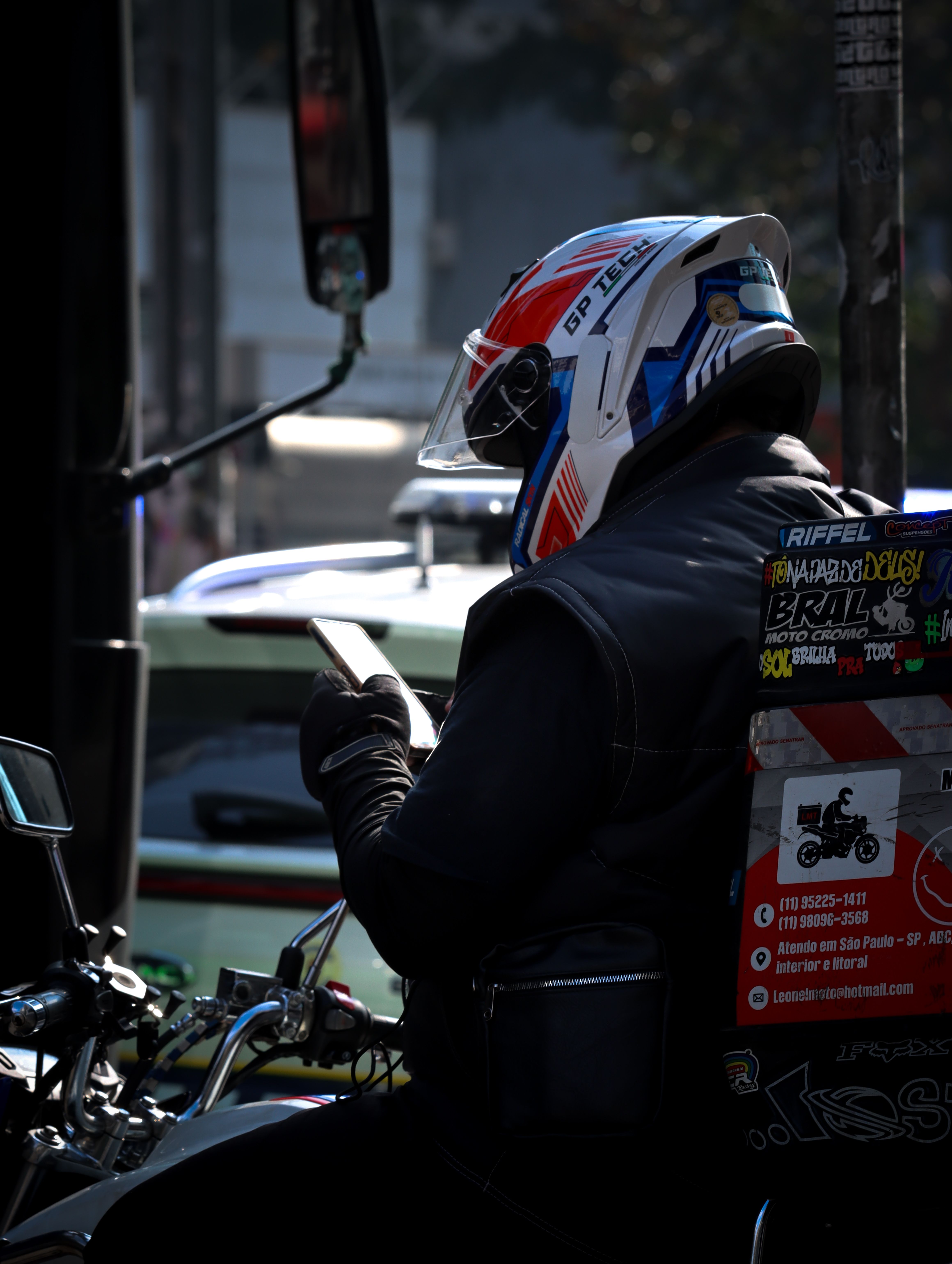 Motorcycle Delivery Driver in Urban Setting · Free Stock Photo