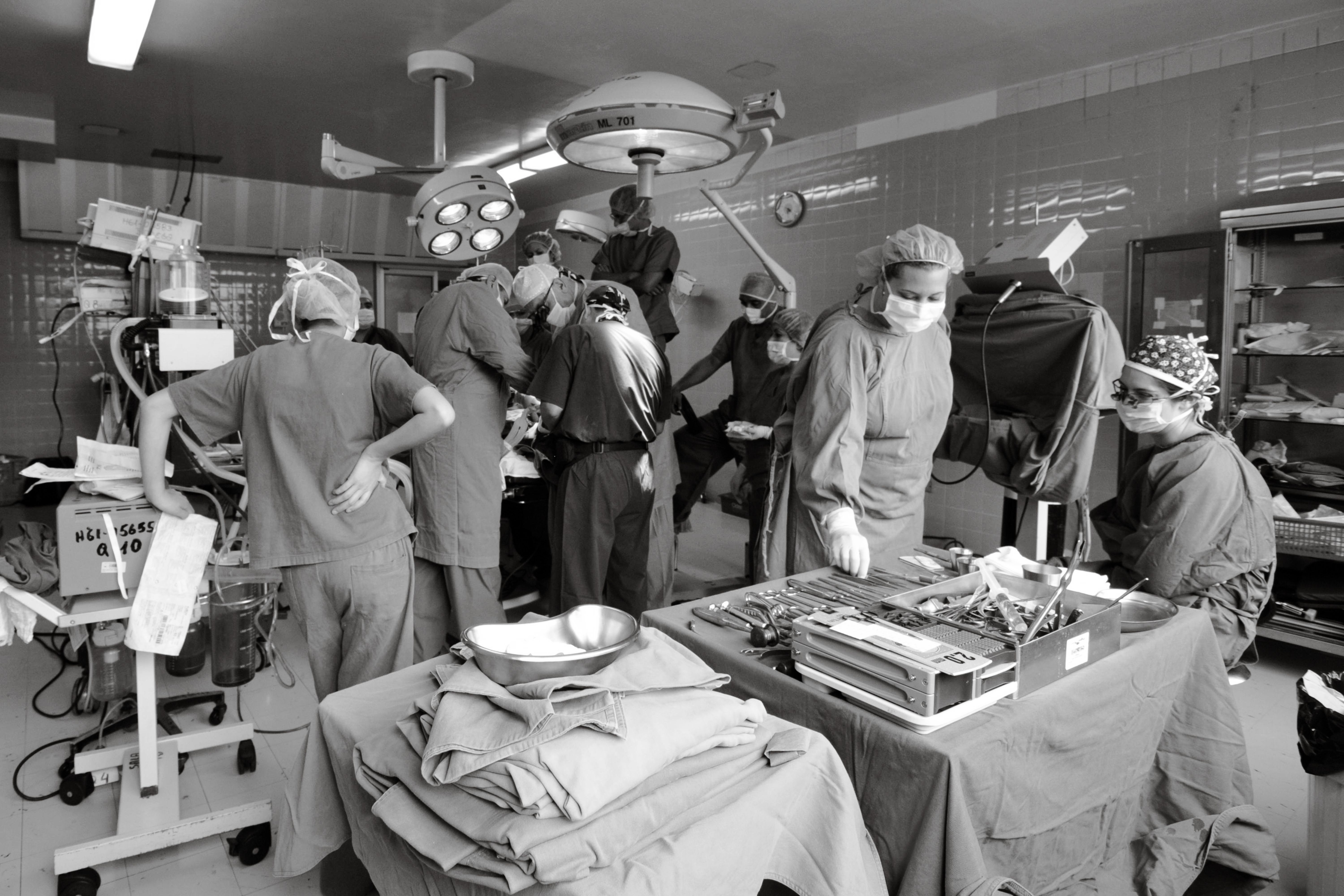 Busy Hospital Operating Room with Surgical Team · Free Stock Photo