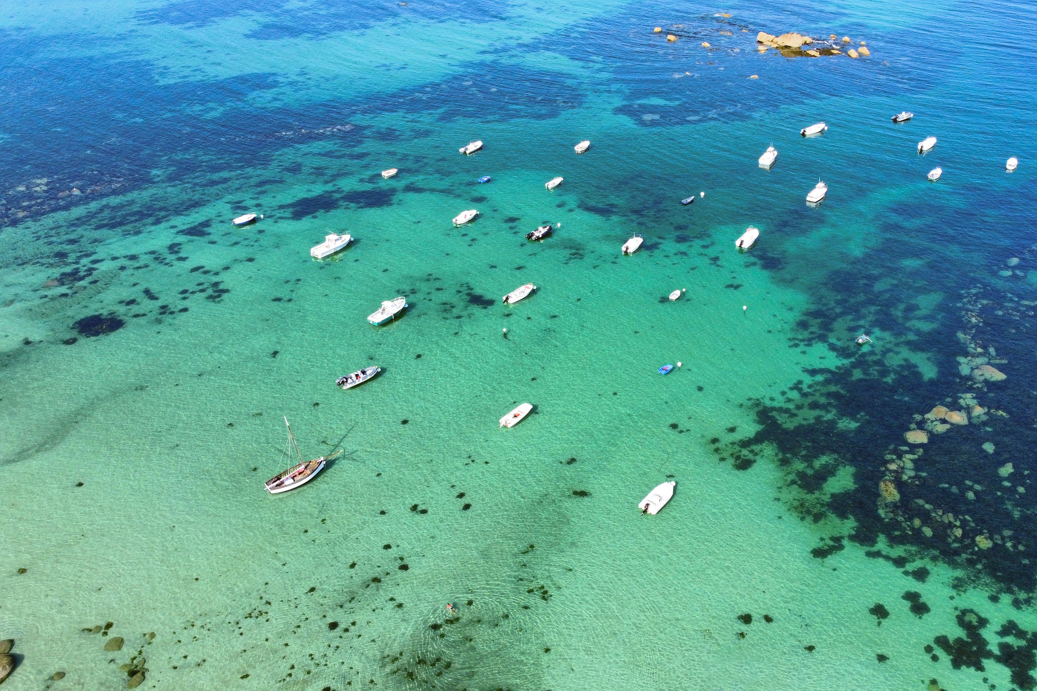 Aerial View of Boats in Crystal Clear Breton Sea · Free Stock Photo
