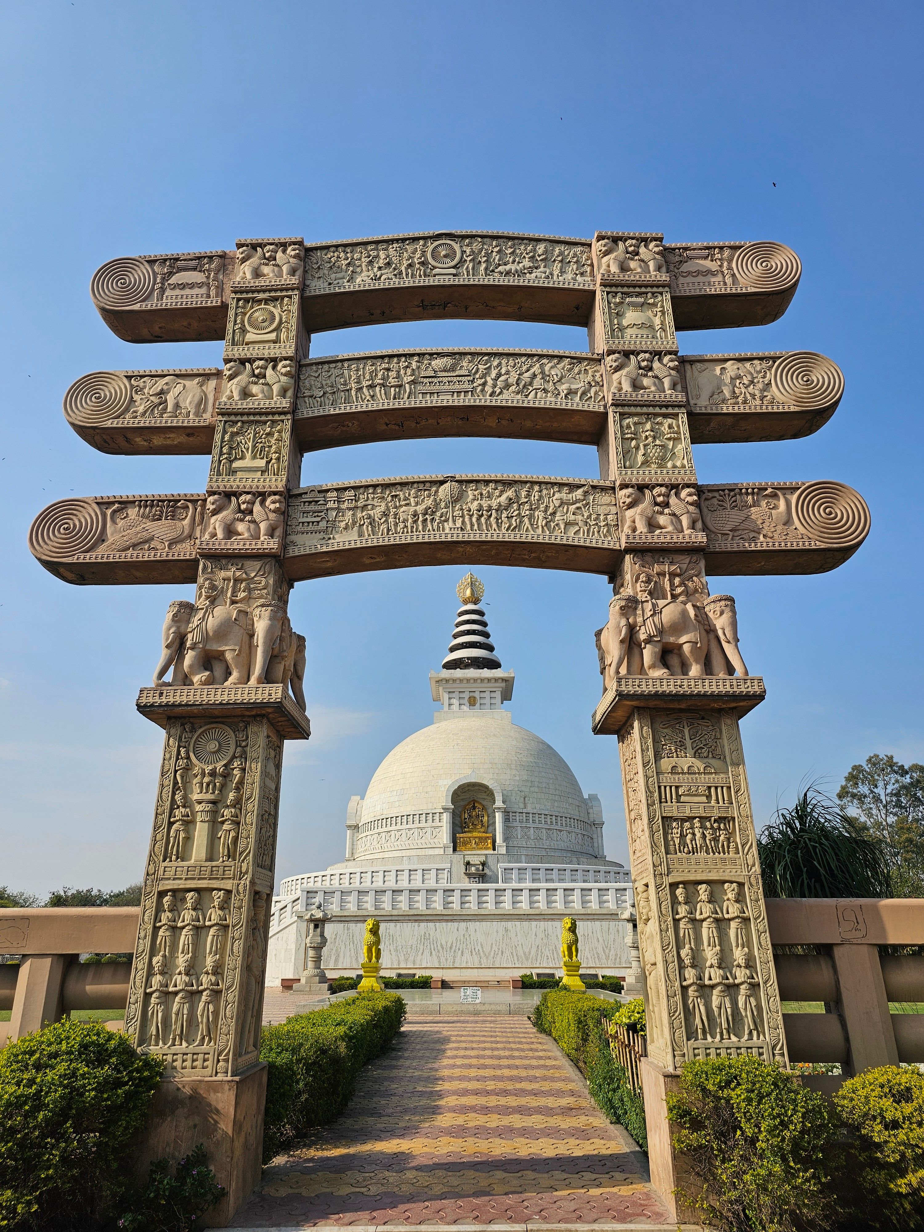 Sanchi Stupa through Ornate Torana Gate · Free Stock Photo