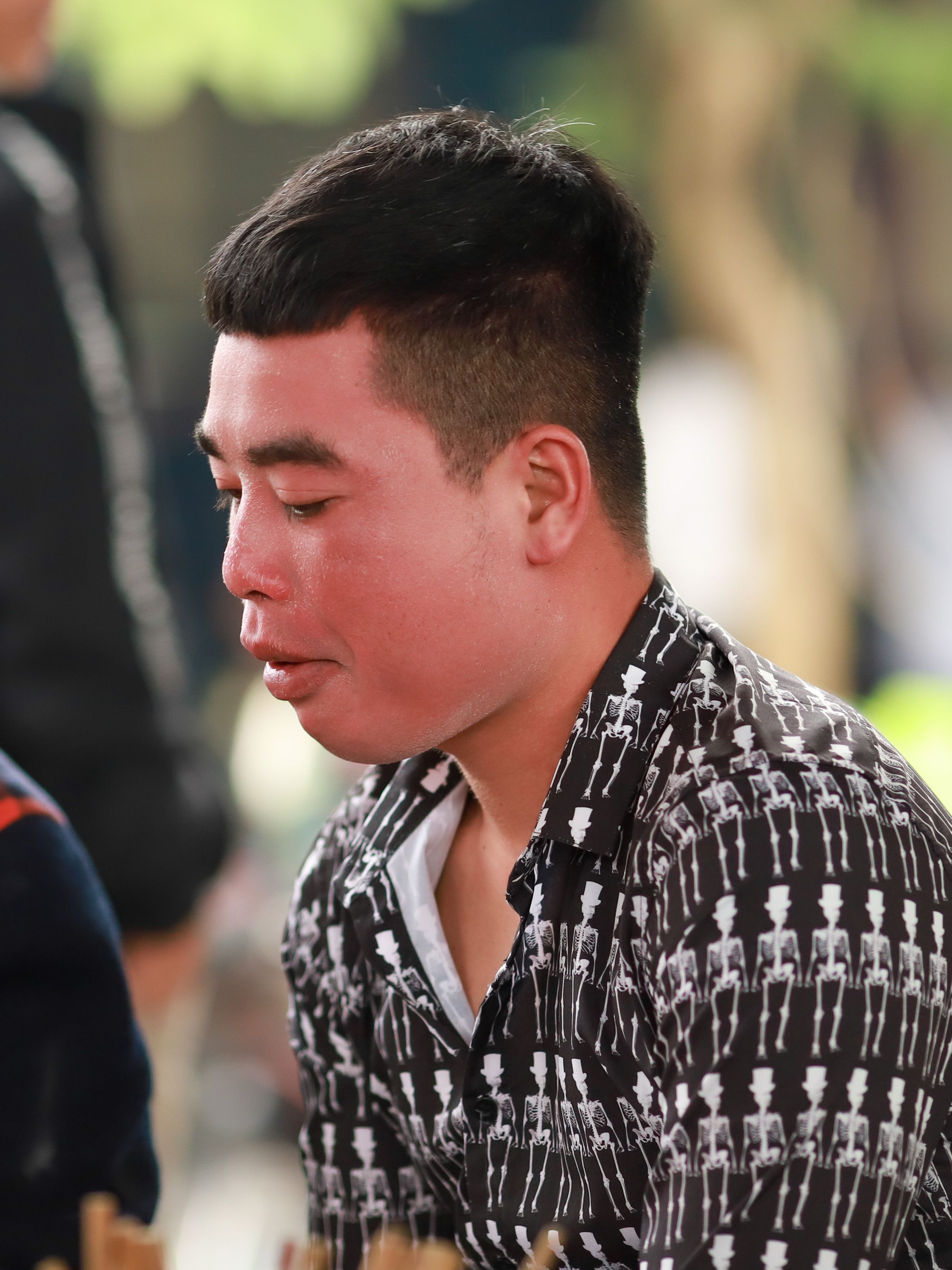 Candid Portrait of a Man at Lào Cai Market · Free Stock Photo