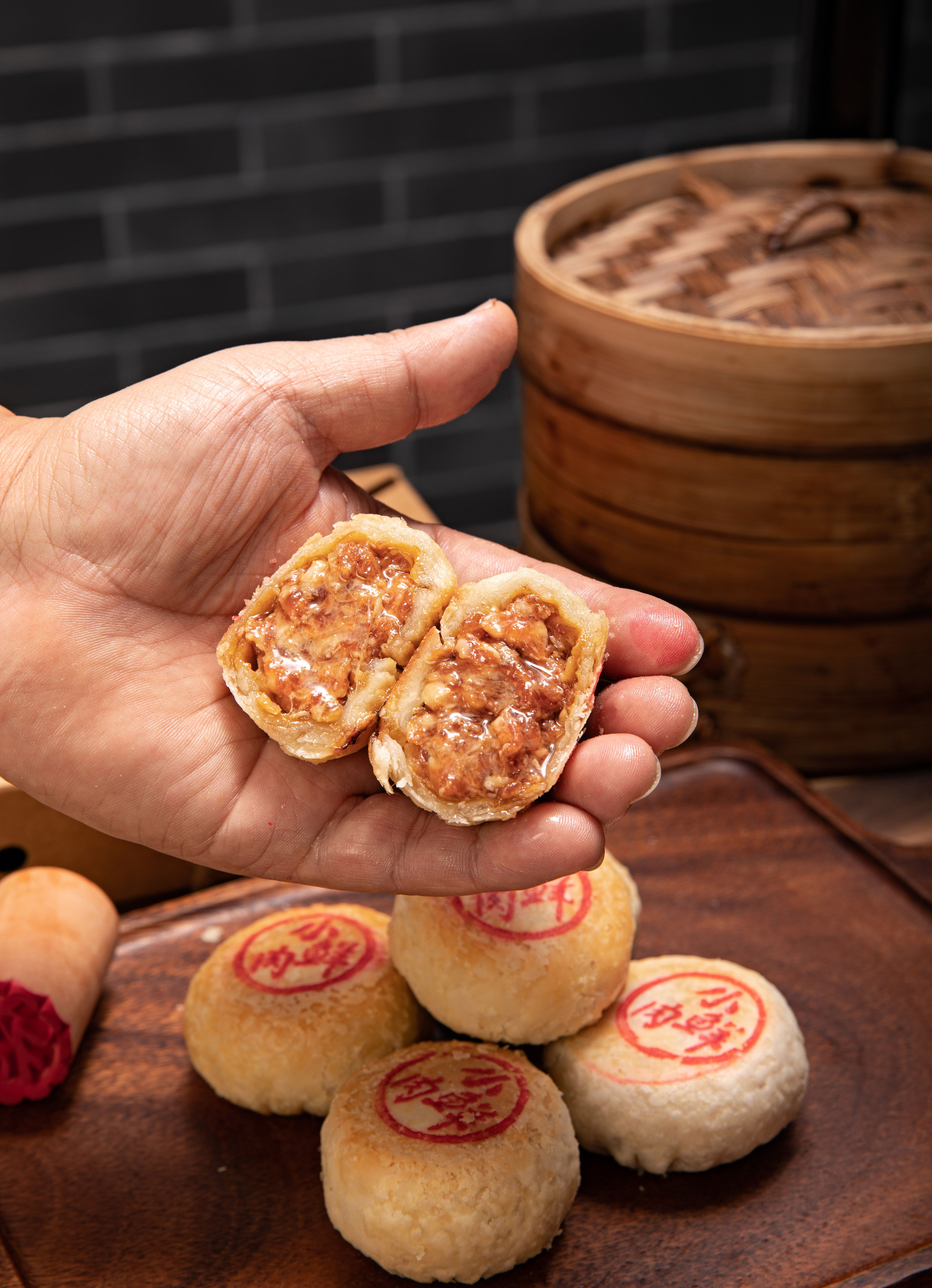 Close-up of traditional Chinese pastries in hand · Free Stock Photo