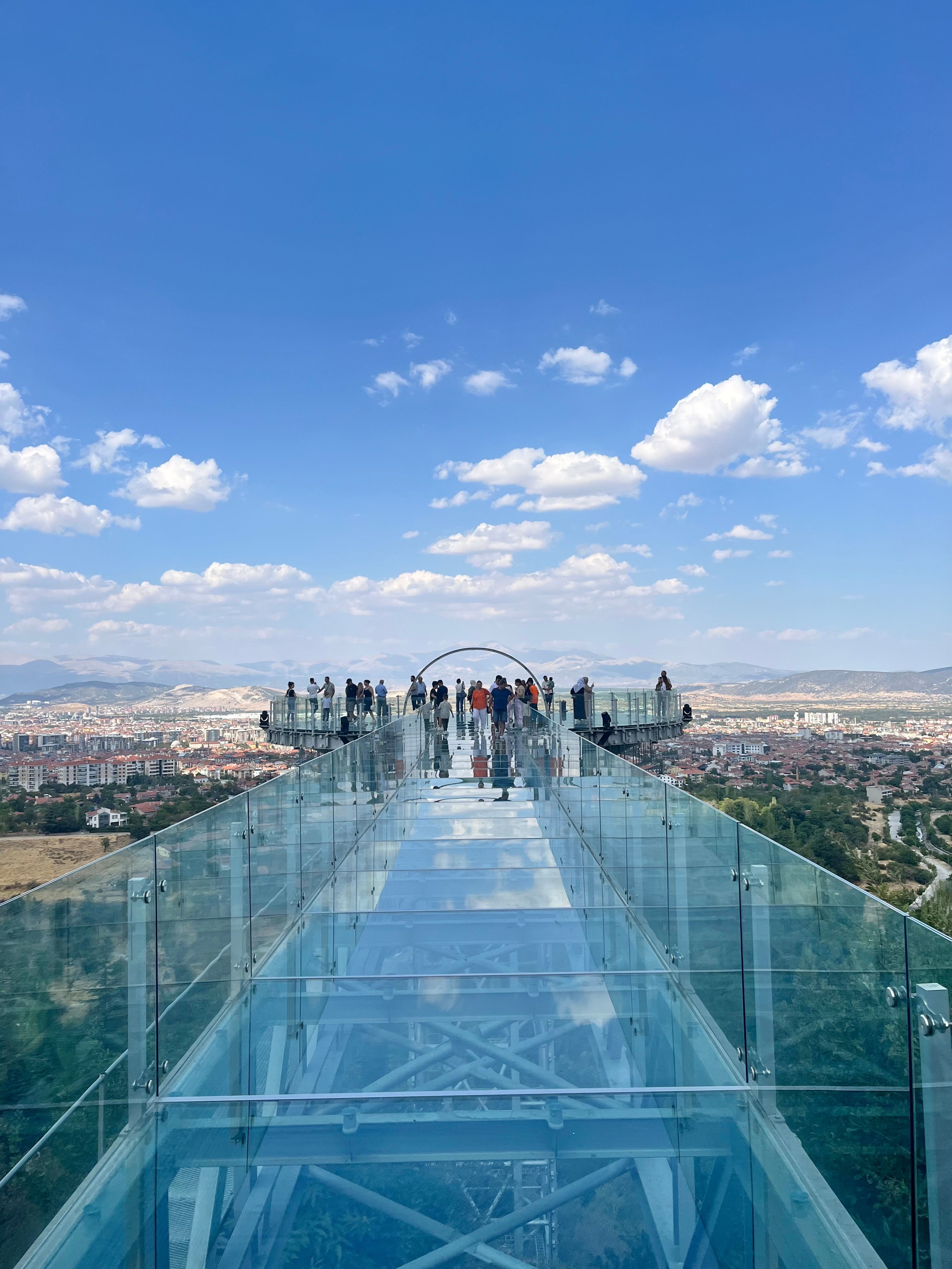 Stunning Glass Walkway Overlooking City · Free Stock Photo