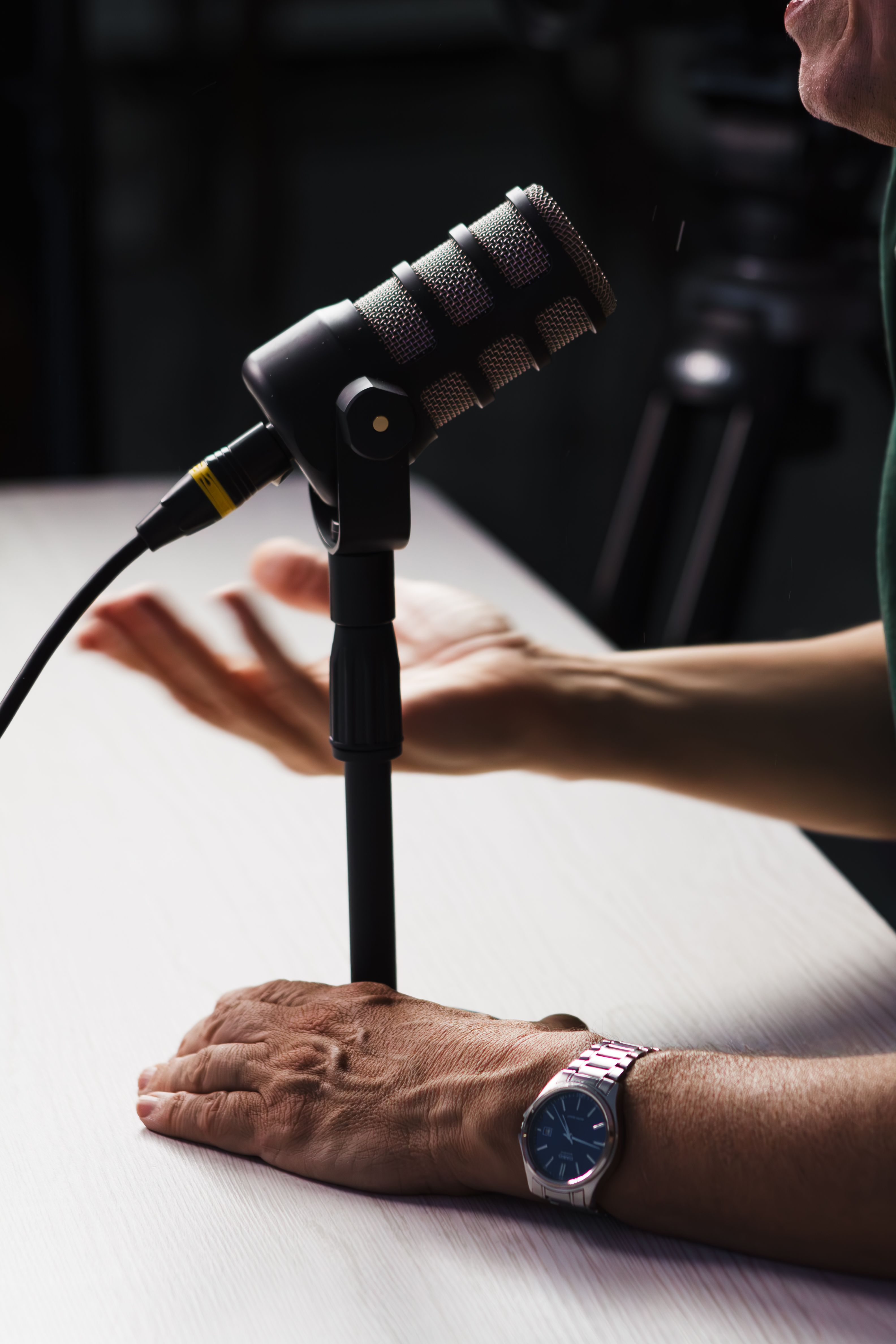 Podcast Studio with Microphone and Hands · Free Stock Photo