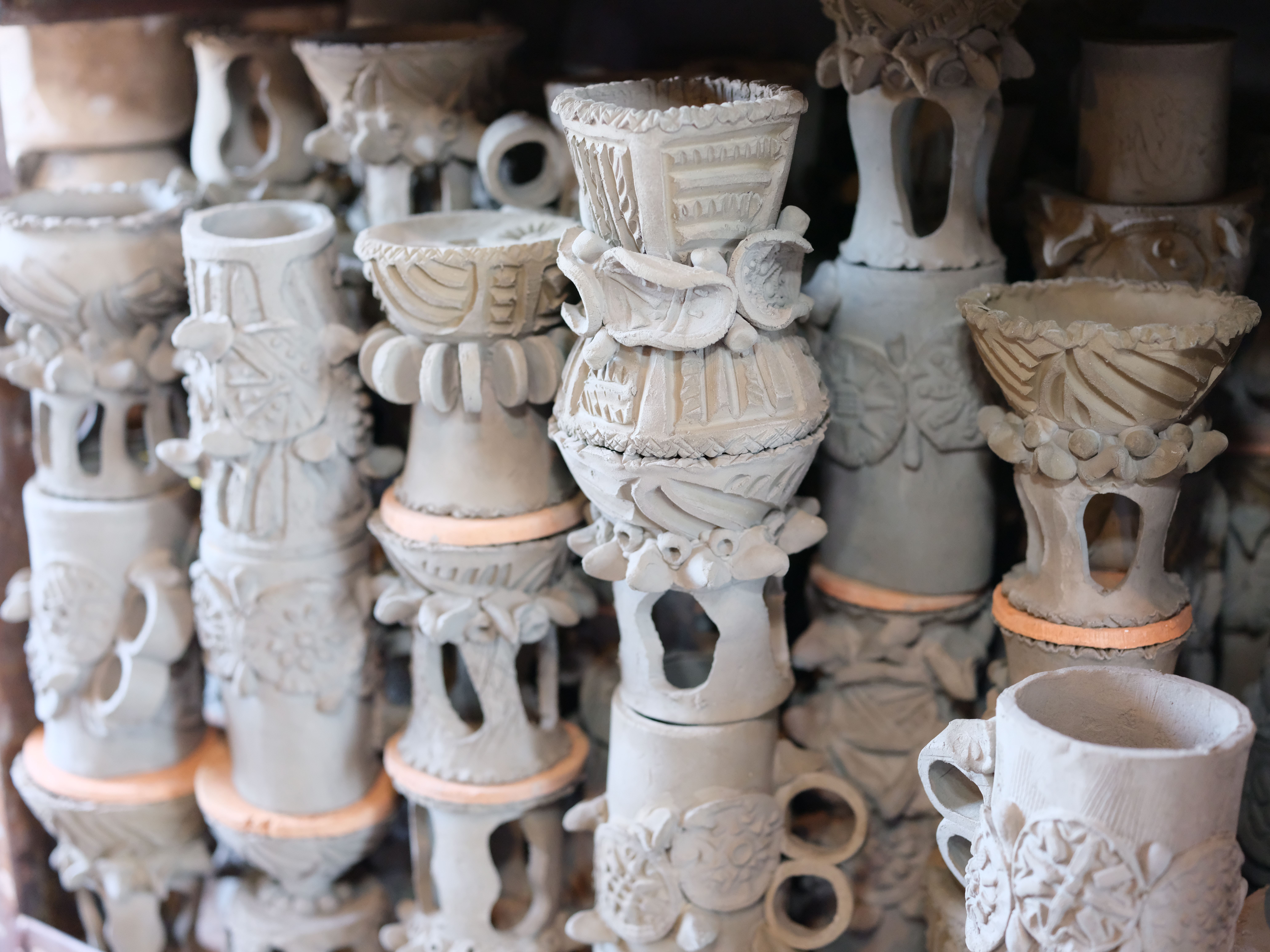 Intricate Handmade Clay Pottery Display · Free Stock Photo
