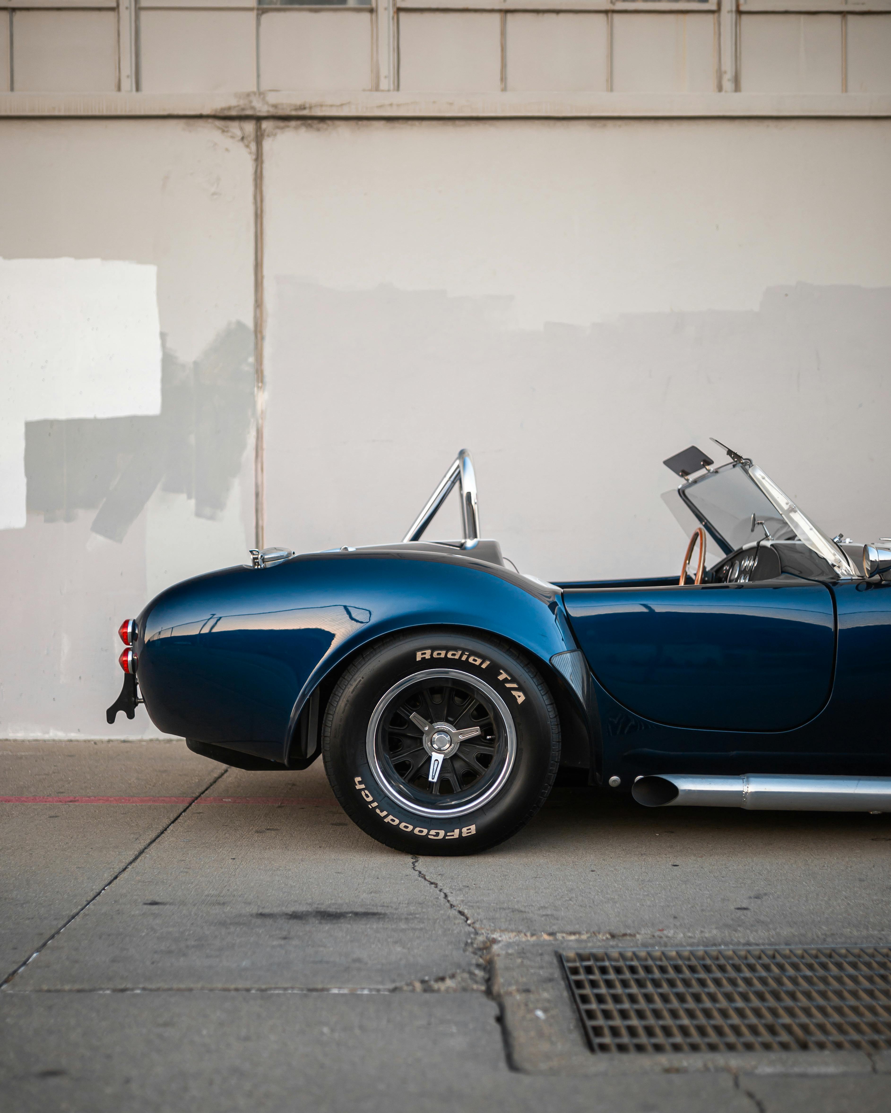Classic Blue Convertible Sports Car Profile · Free Stock Photo