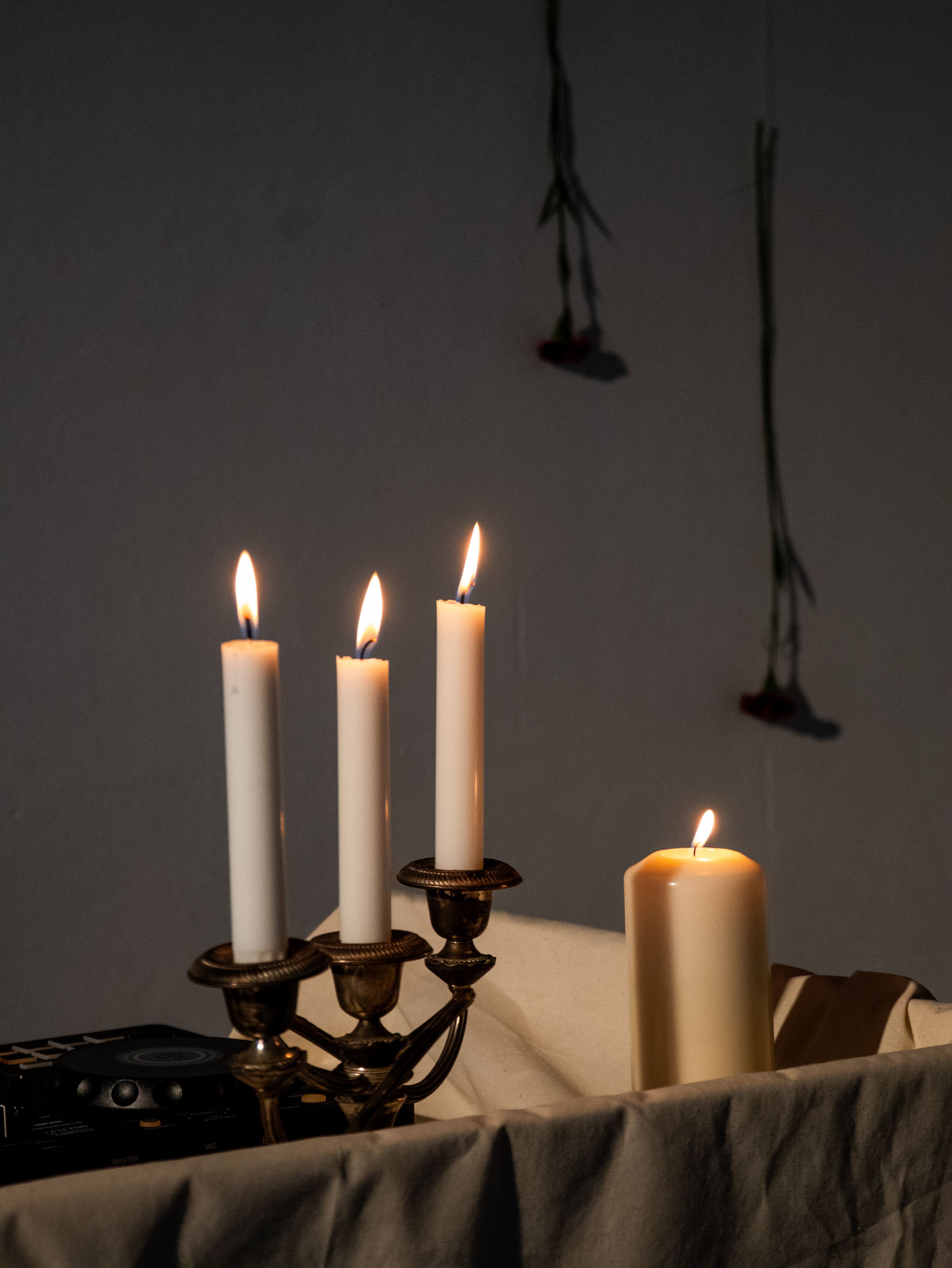 Elegant Candlelit Scene with Shadows · Free Stock Photo