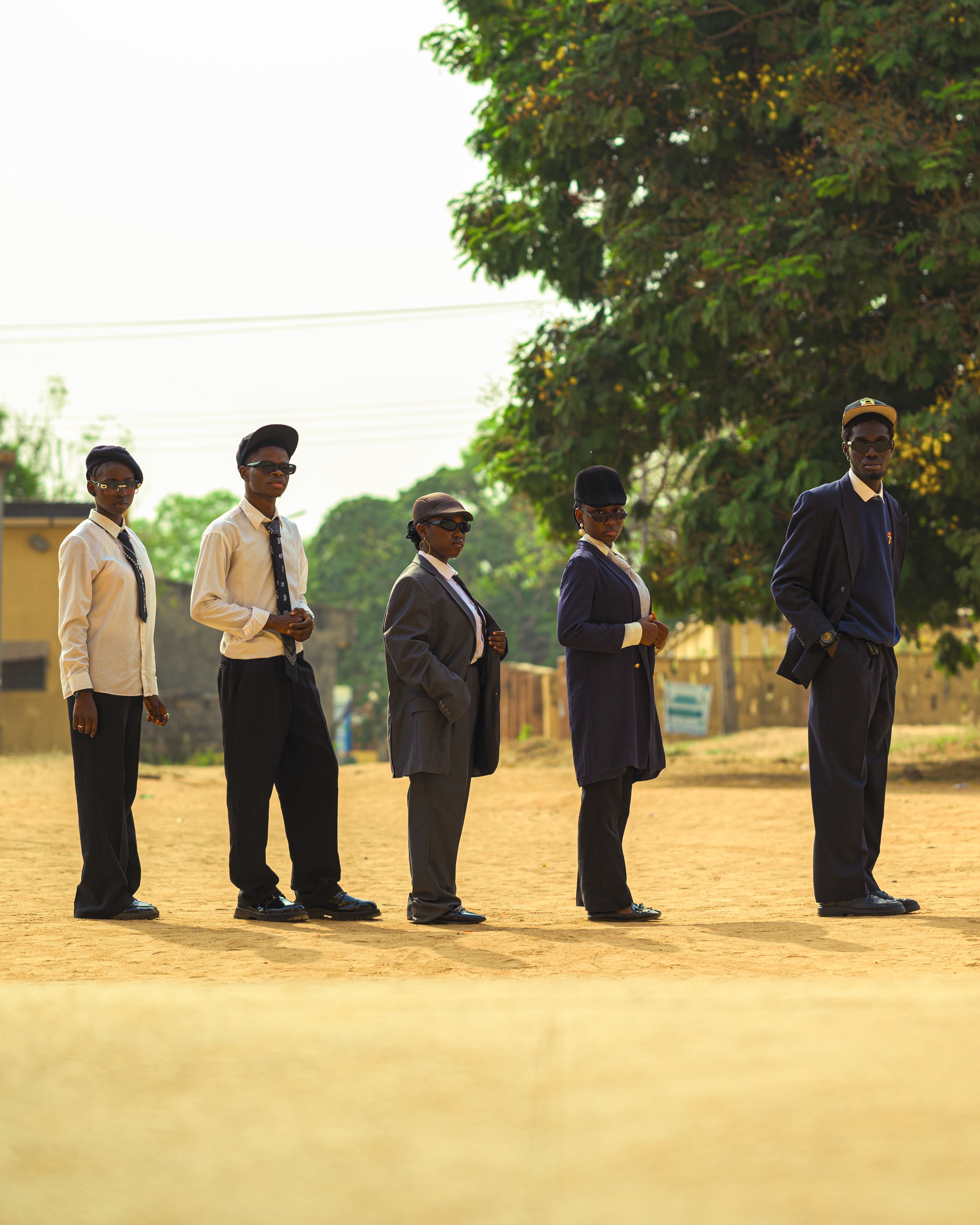 Five People Striking a Pose Outdoors · Free Stock Photo