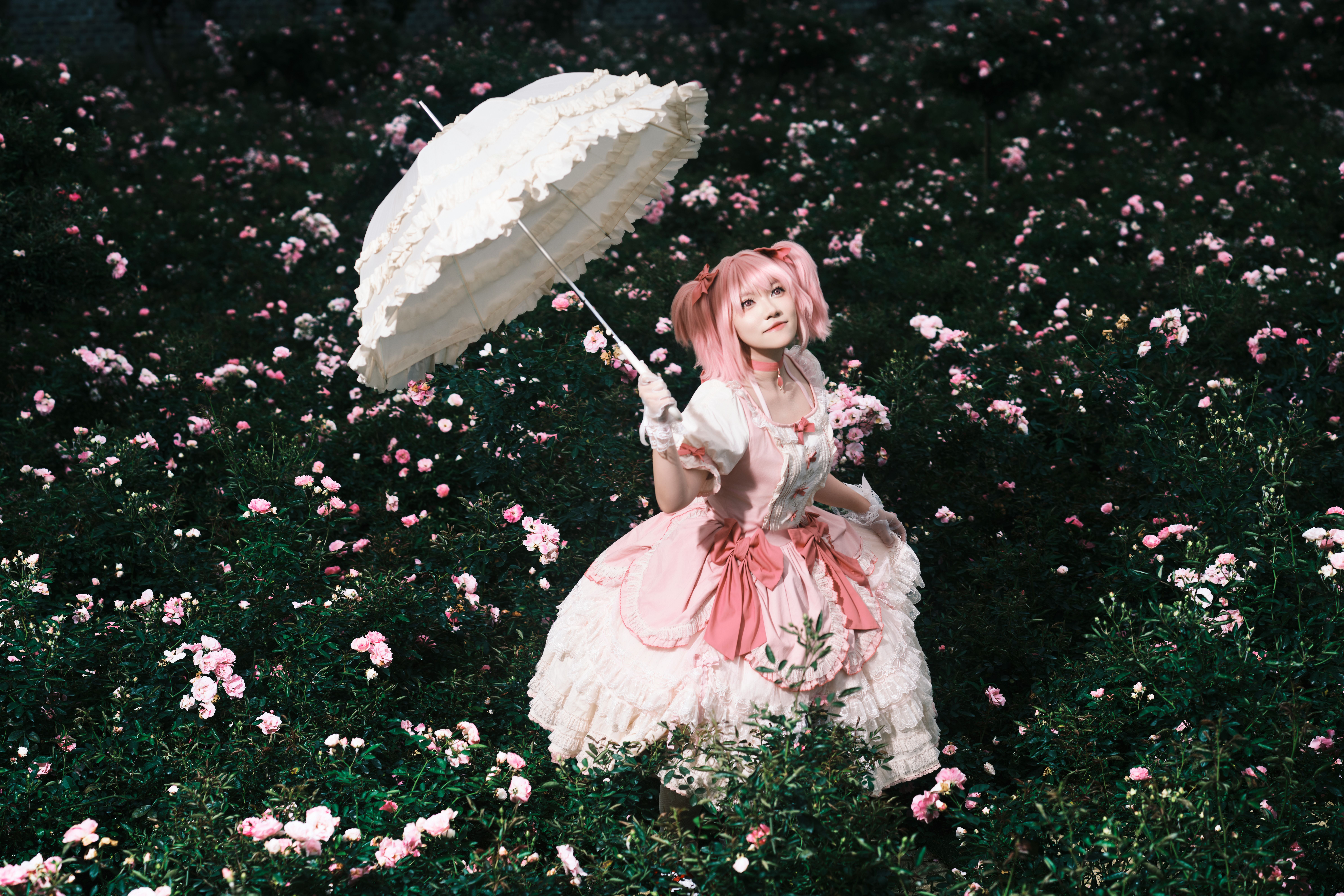 Elegant Cosplay in a Lush Flower Garden · Free Stock Photo