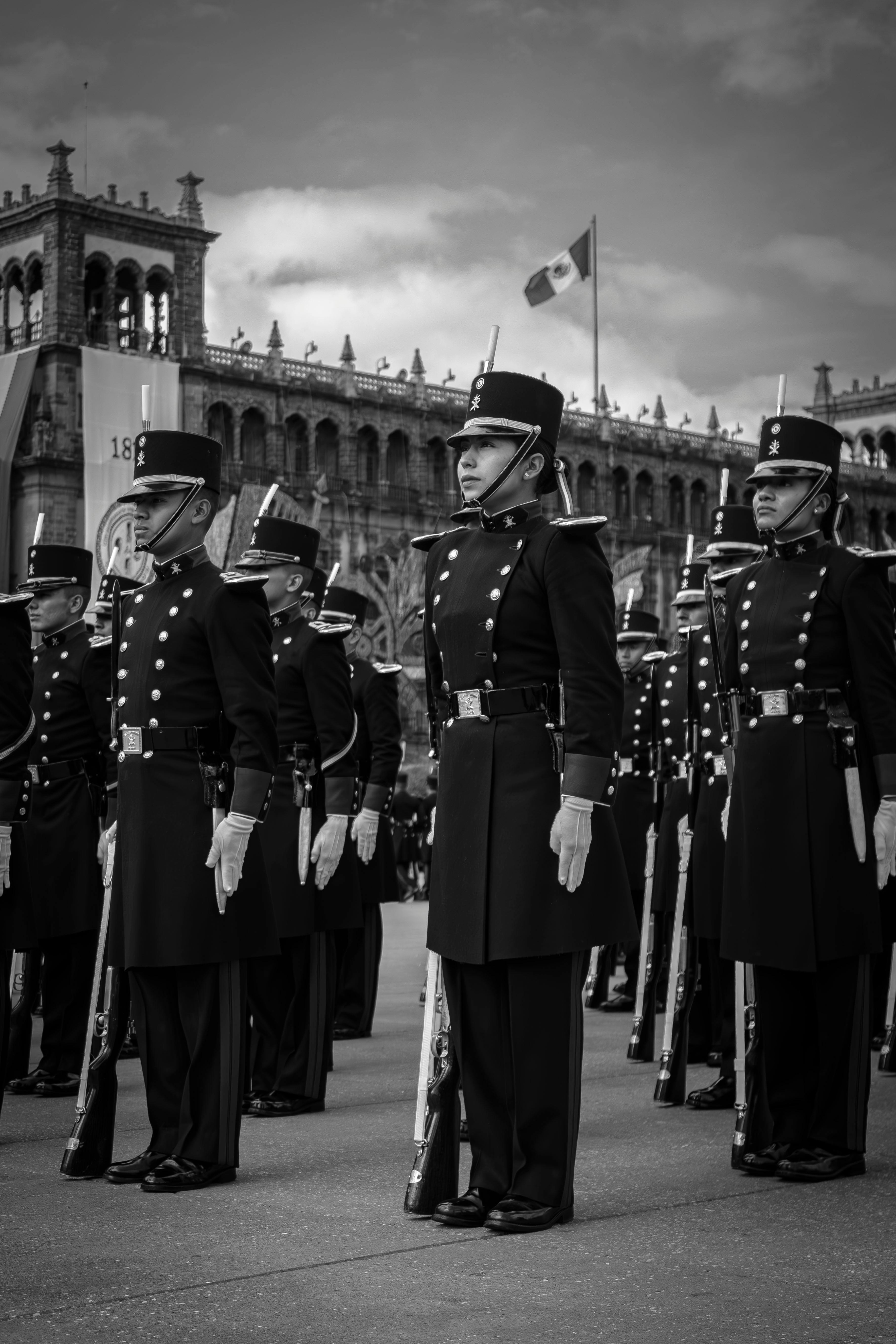 Black and White Military Parade in Urban Setting · Free Stock Photo