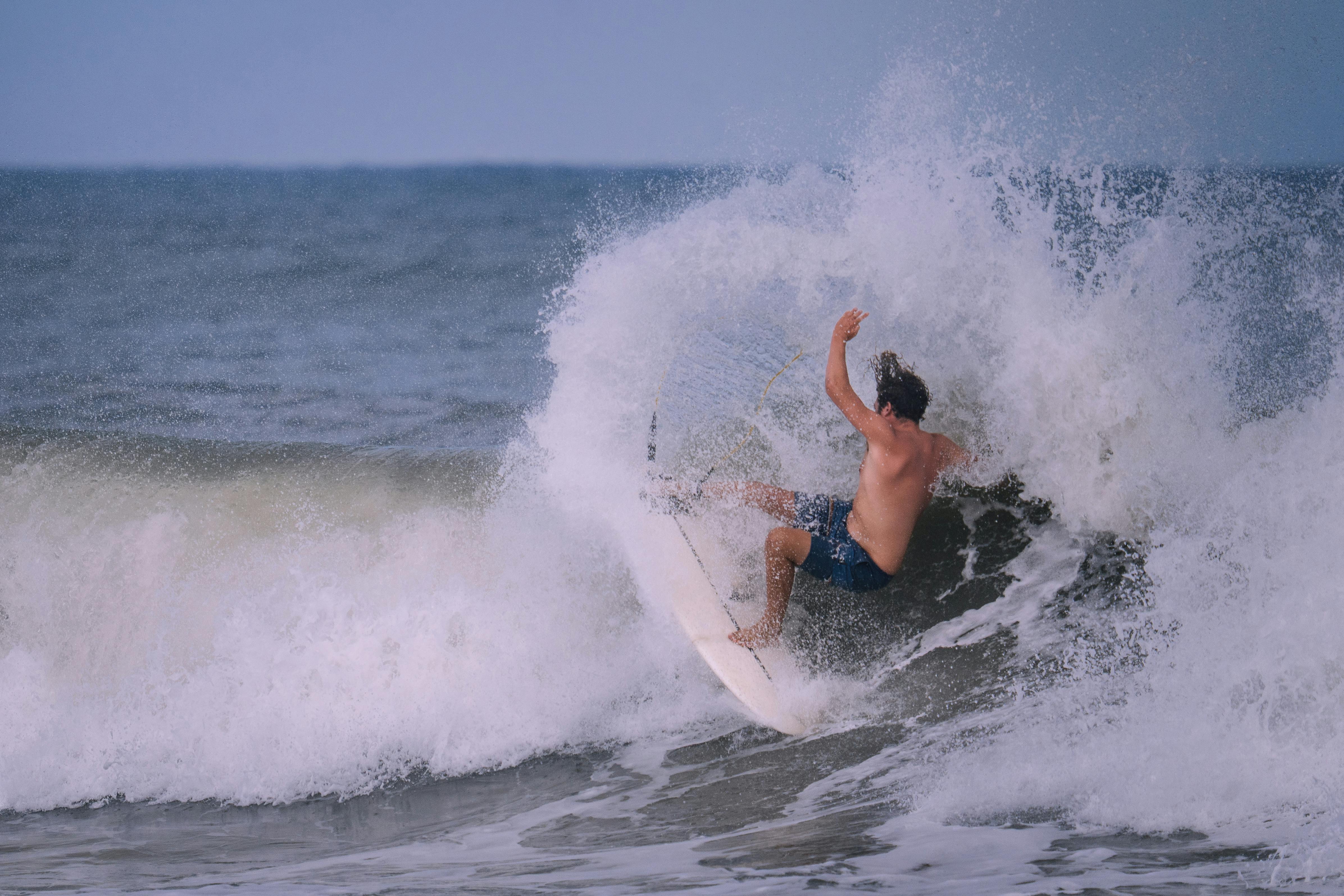 Dynamic Surfing Action at Sea · Free Stock Photo