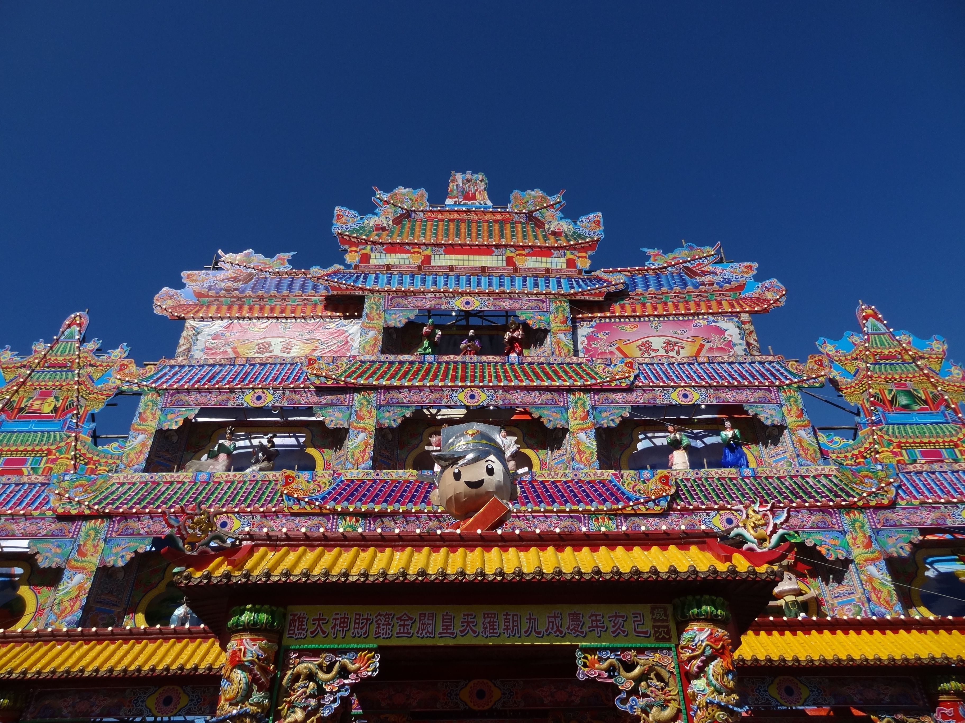 Vibrant Traditional Chinese Temple Under Blue Sky · Free Stock Photo