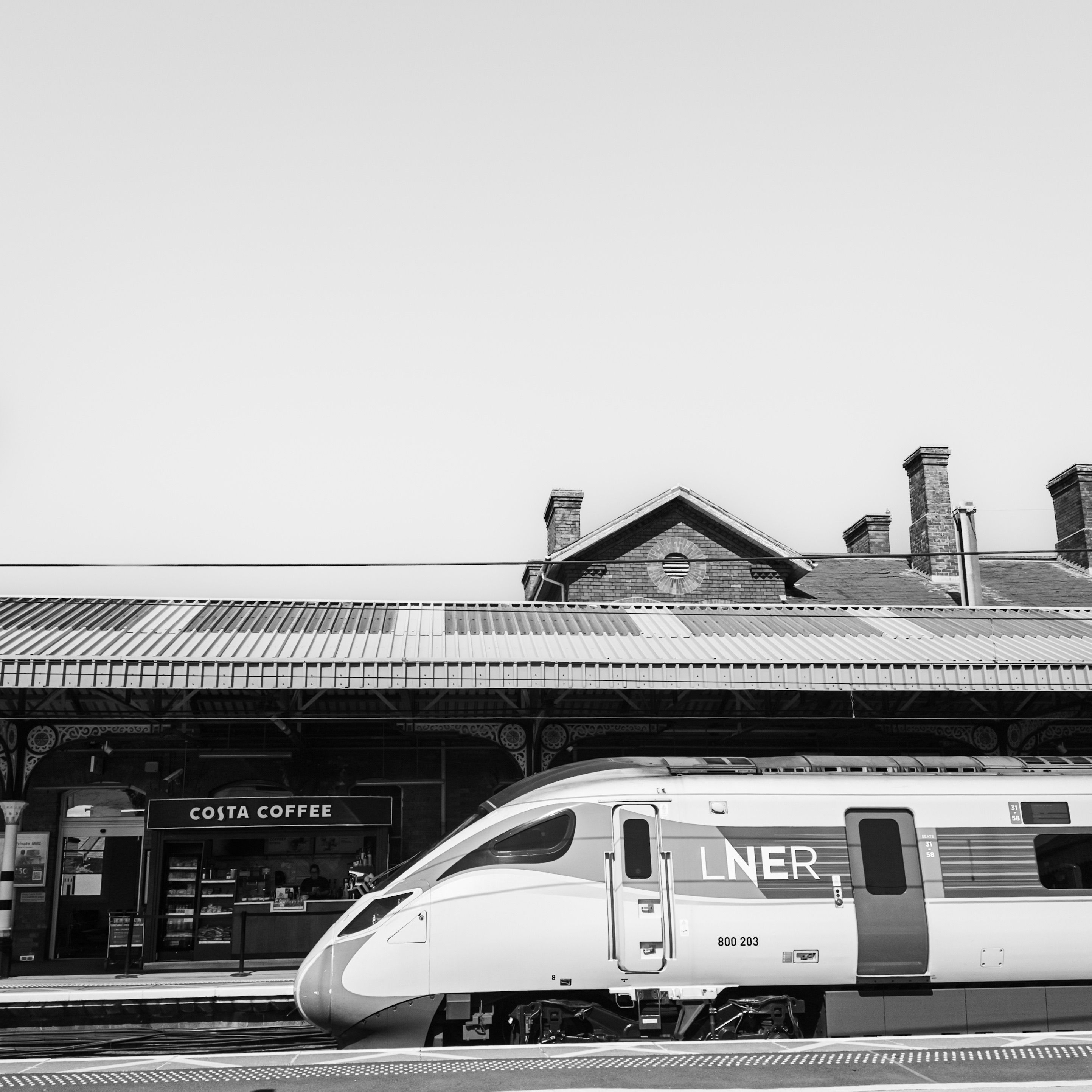 Modern LNER Train at Historic English Station · Free Stock Photo