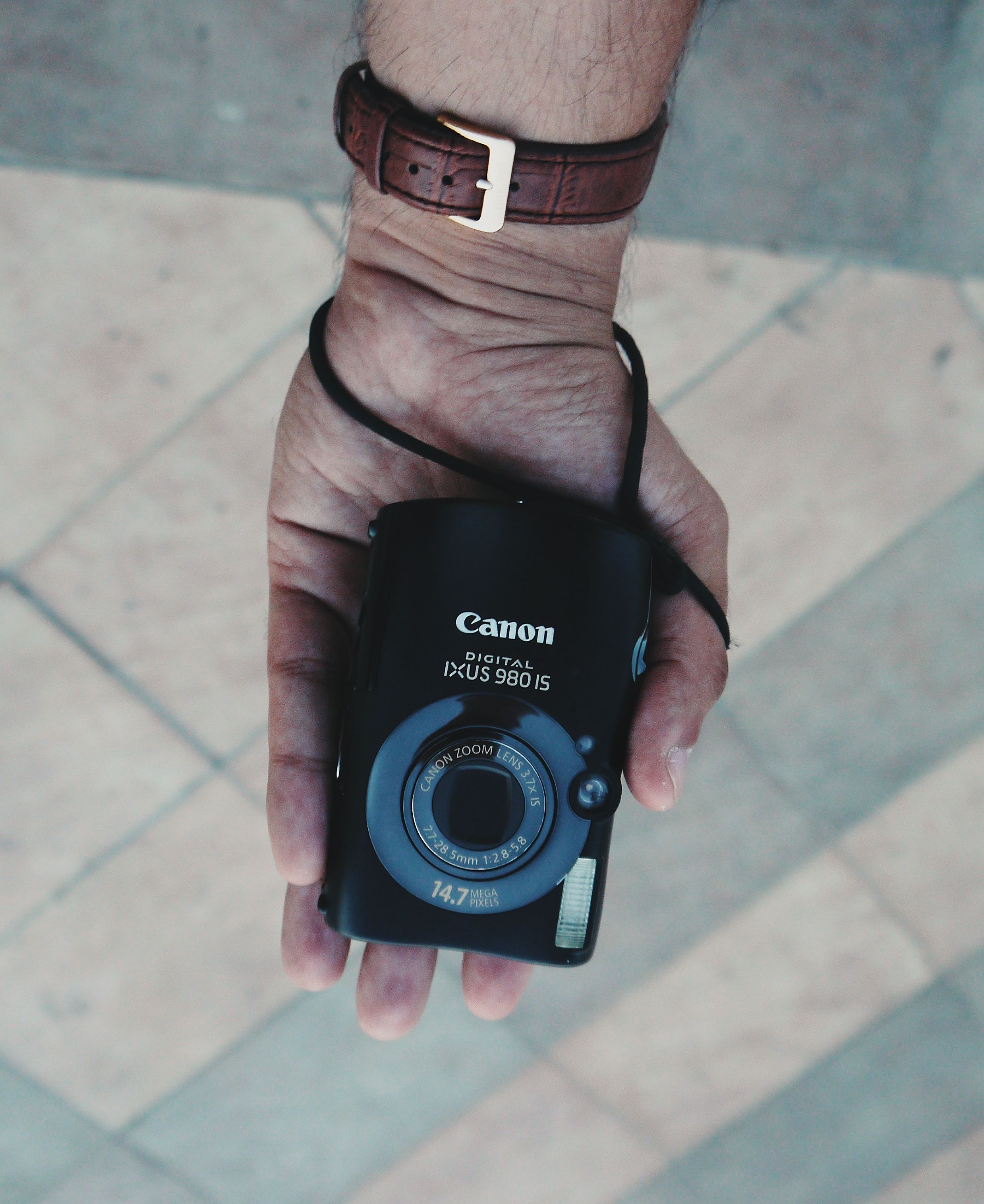 Close-up of Hand Holding Digital Camera · Free Stock Photo