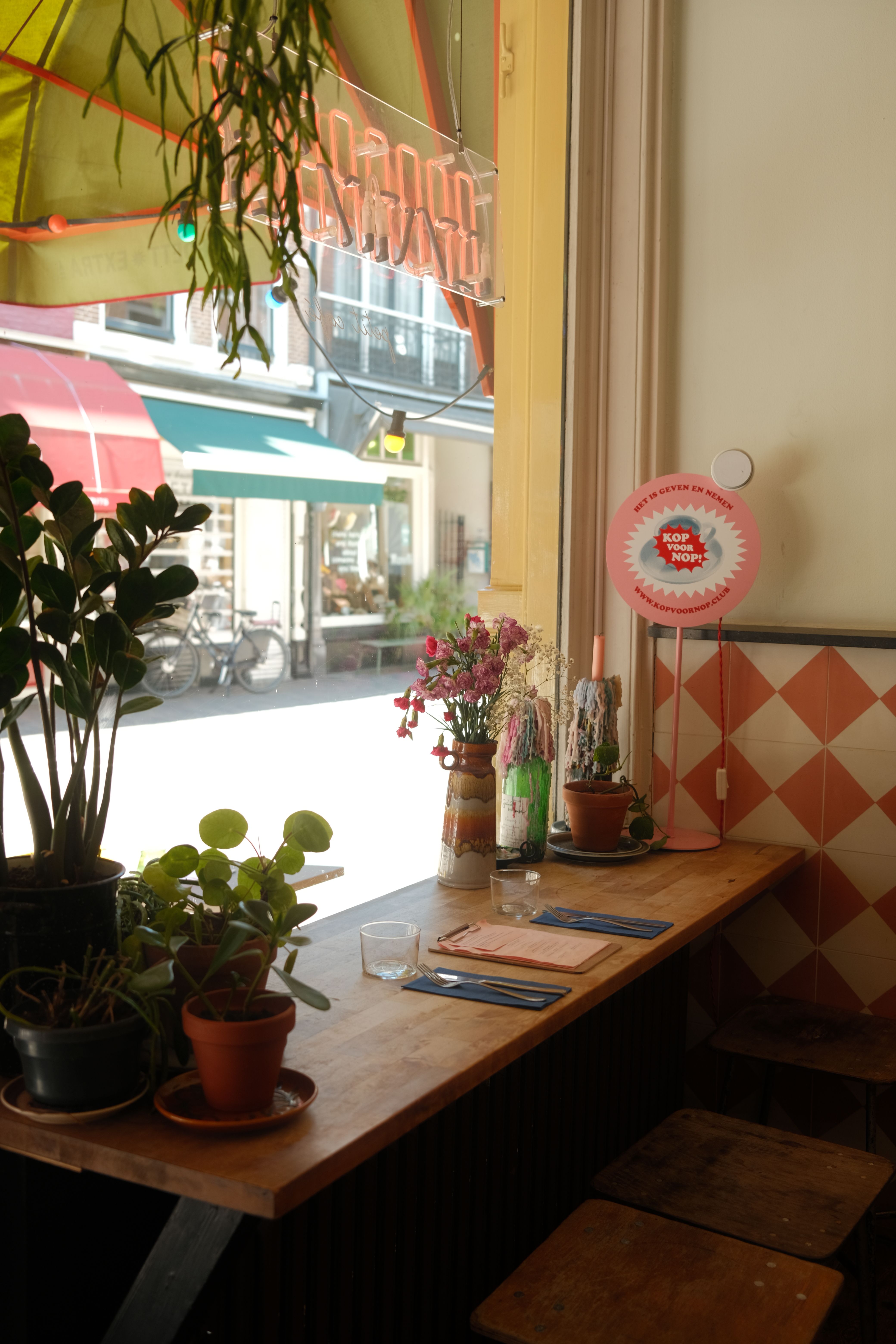 Cozy Café Window Seat with Urban View · Free Stock Photo