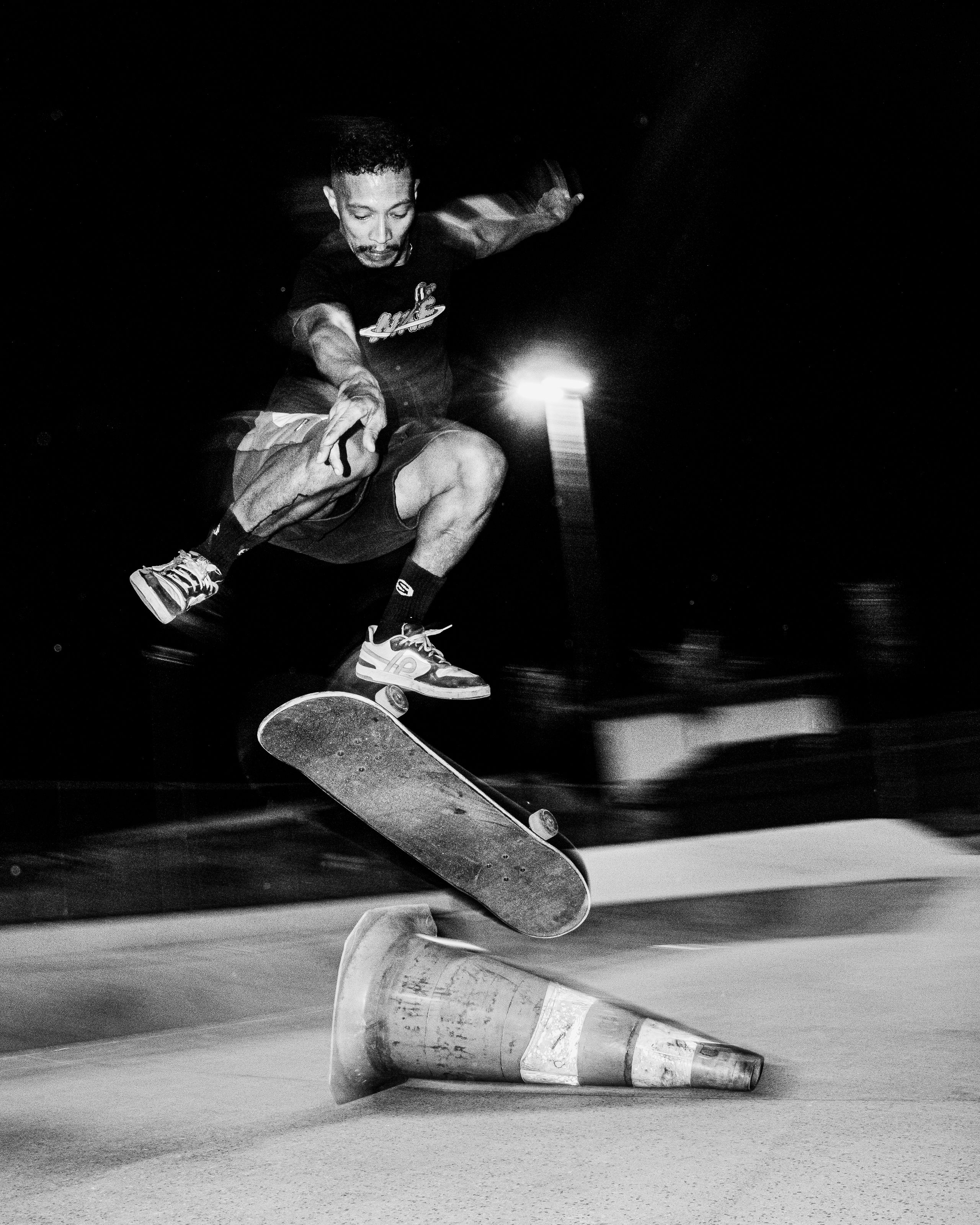 Dynamic Skateboarding Stunt at Night · Free Stock Photo