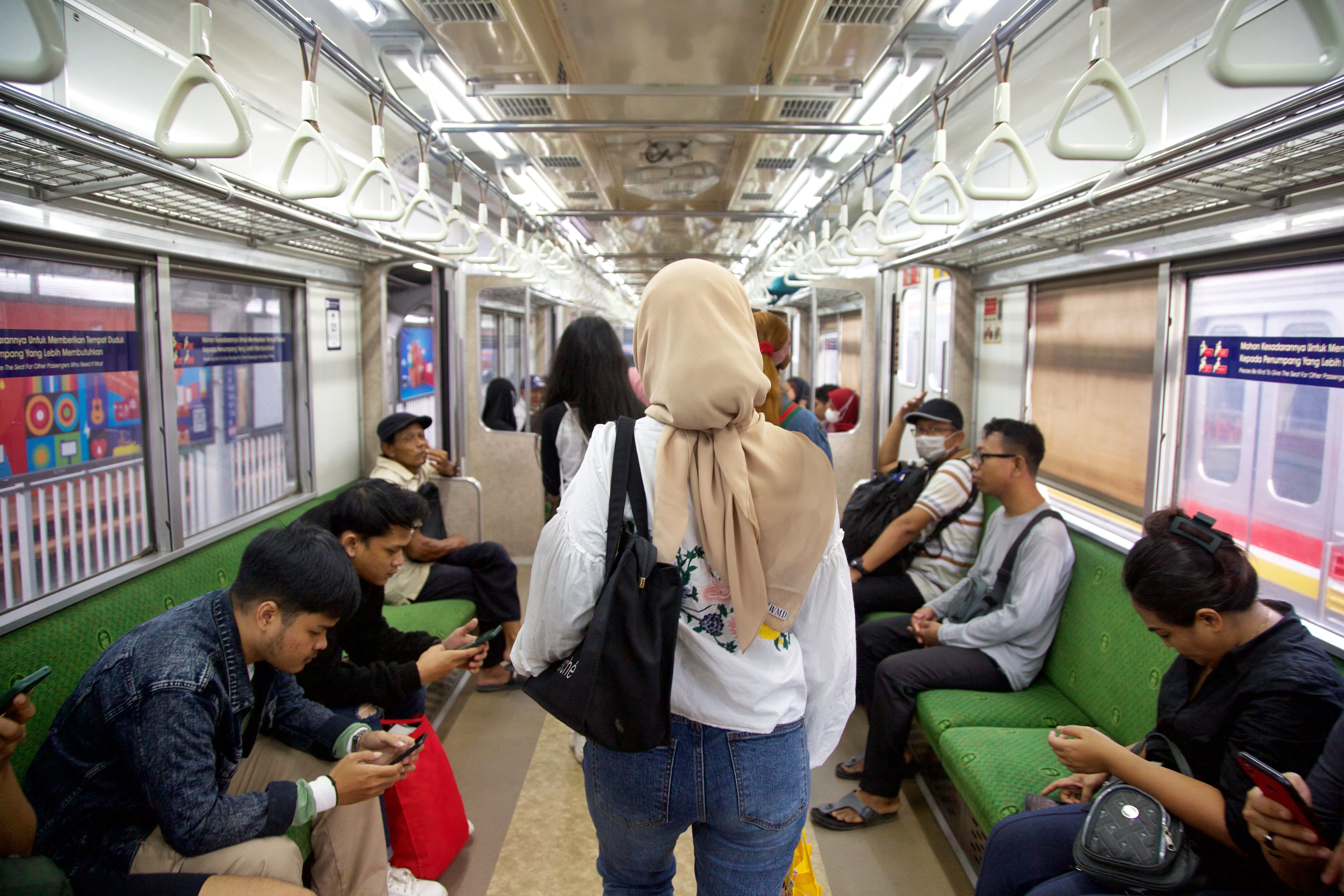 Commuters in a Busy Subway Train Interior · Free Stock Photo