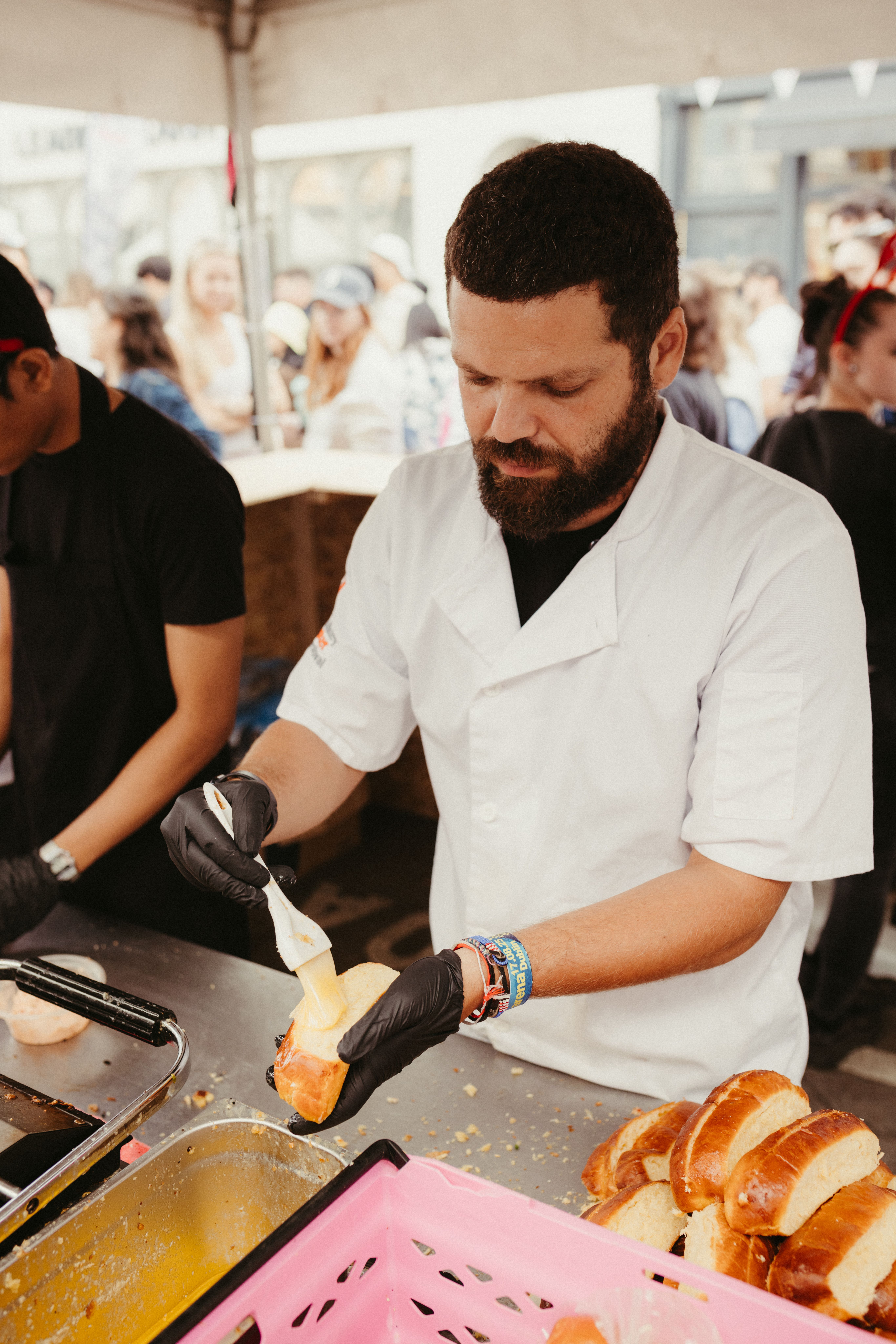 Street Food Festival Chef Preparing Dishes · Free Stock Photo